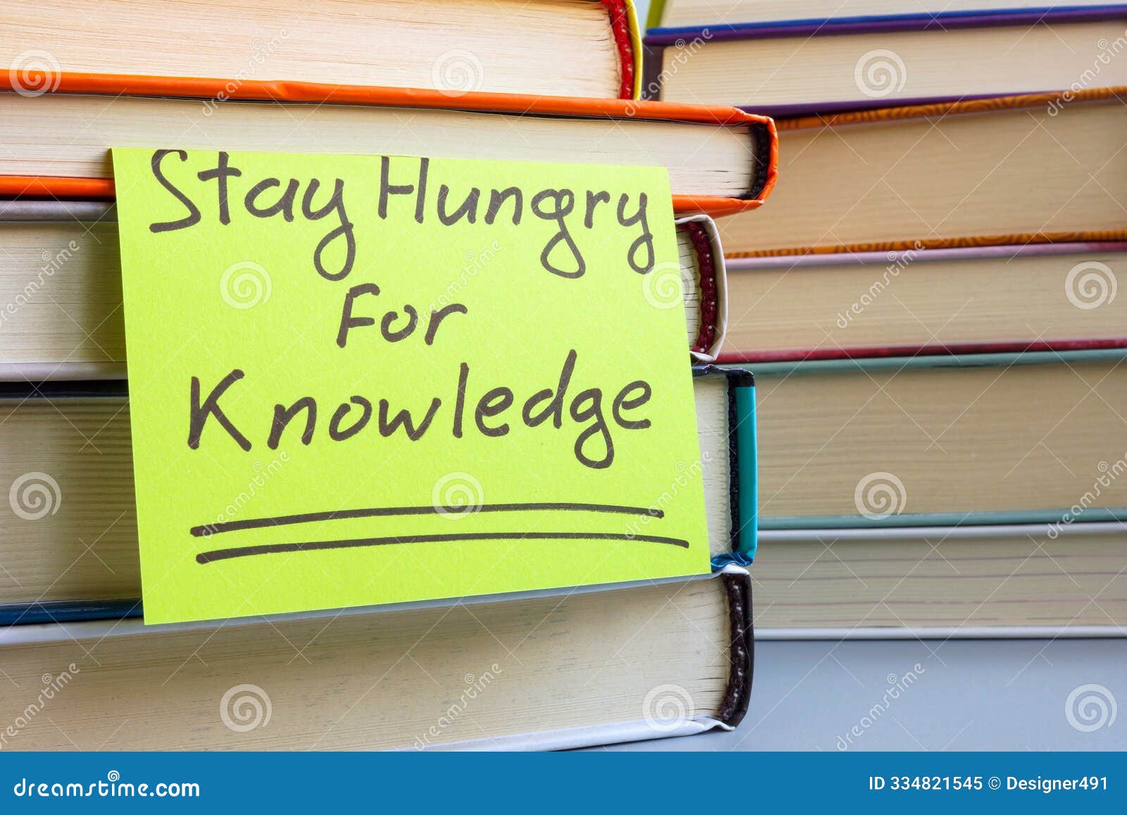 Stack of Books with Stay Hungry for Knowledge Note As a Symbol of ...