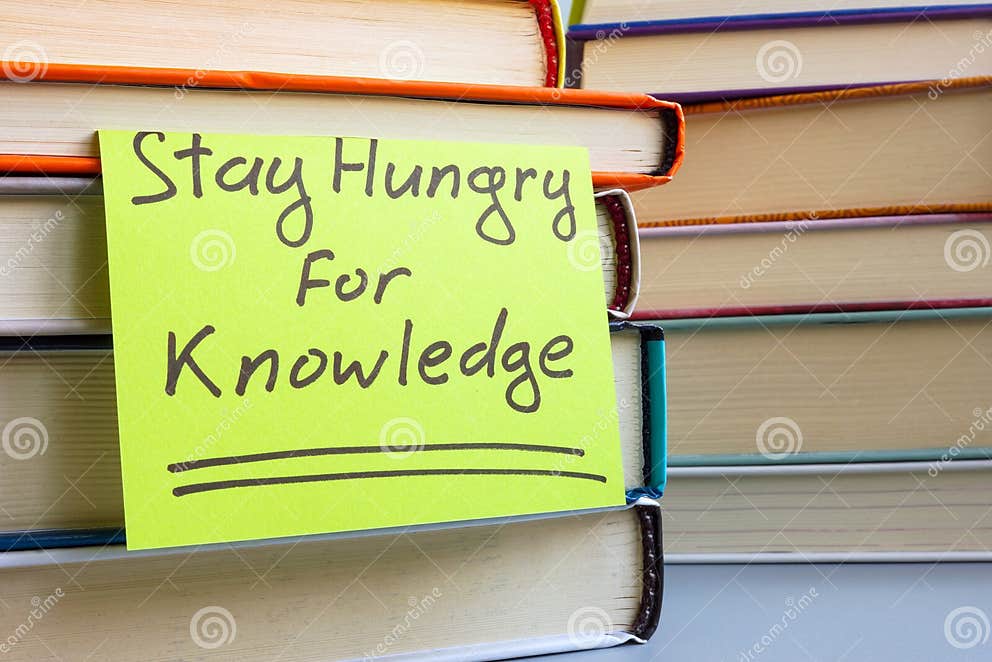Stack of Books with Stay Hungry for Knowledge Note As a Symbol of Lifelong Learning. Stock Image ...