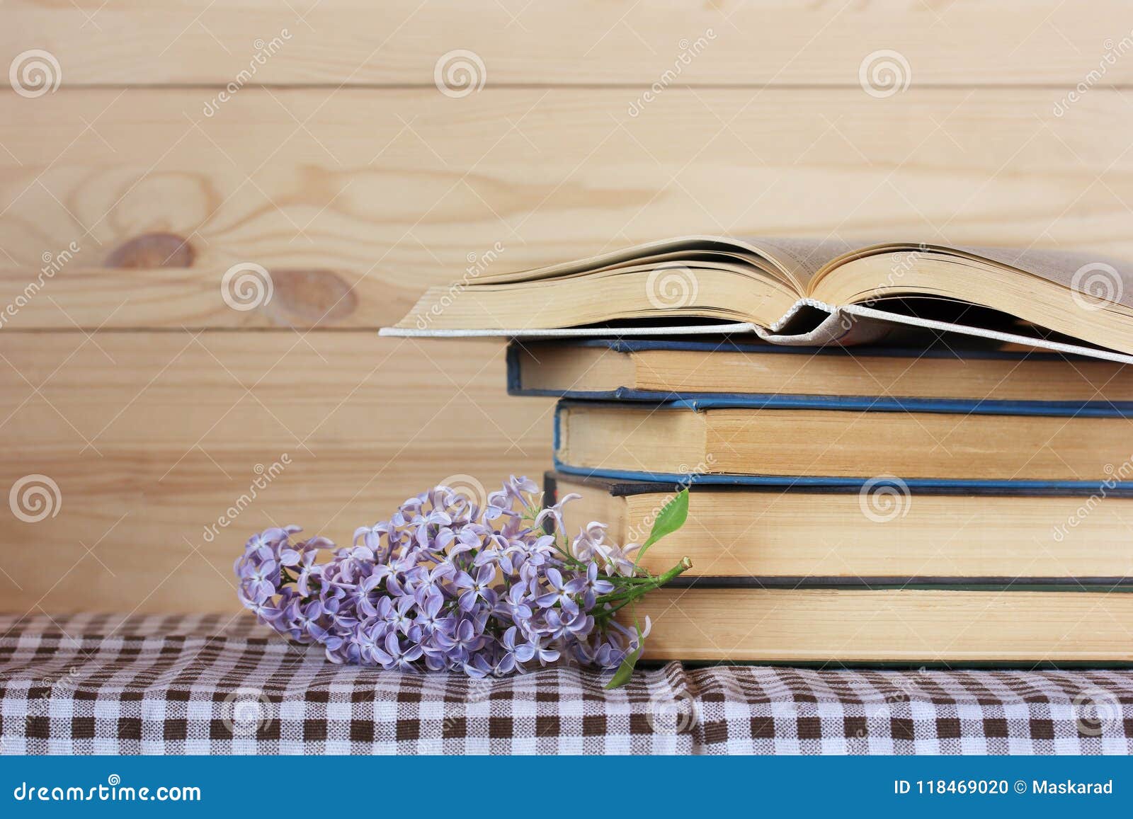 Stack of Books on the Table and Lilacs. Stock Photo - Image of lilac ...