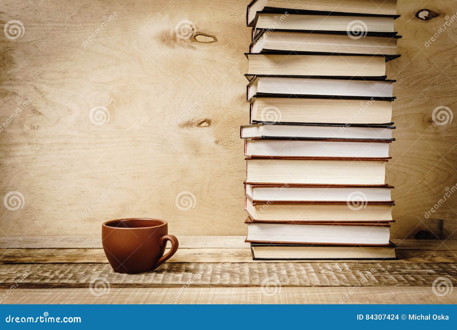 Stack of books and tea stock photo. Image of background - 84307424