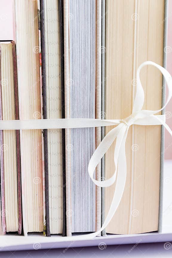 Stack of Books Tied with a Bow Stock Image - Image of cover, classics ...