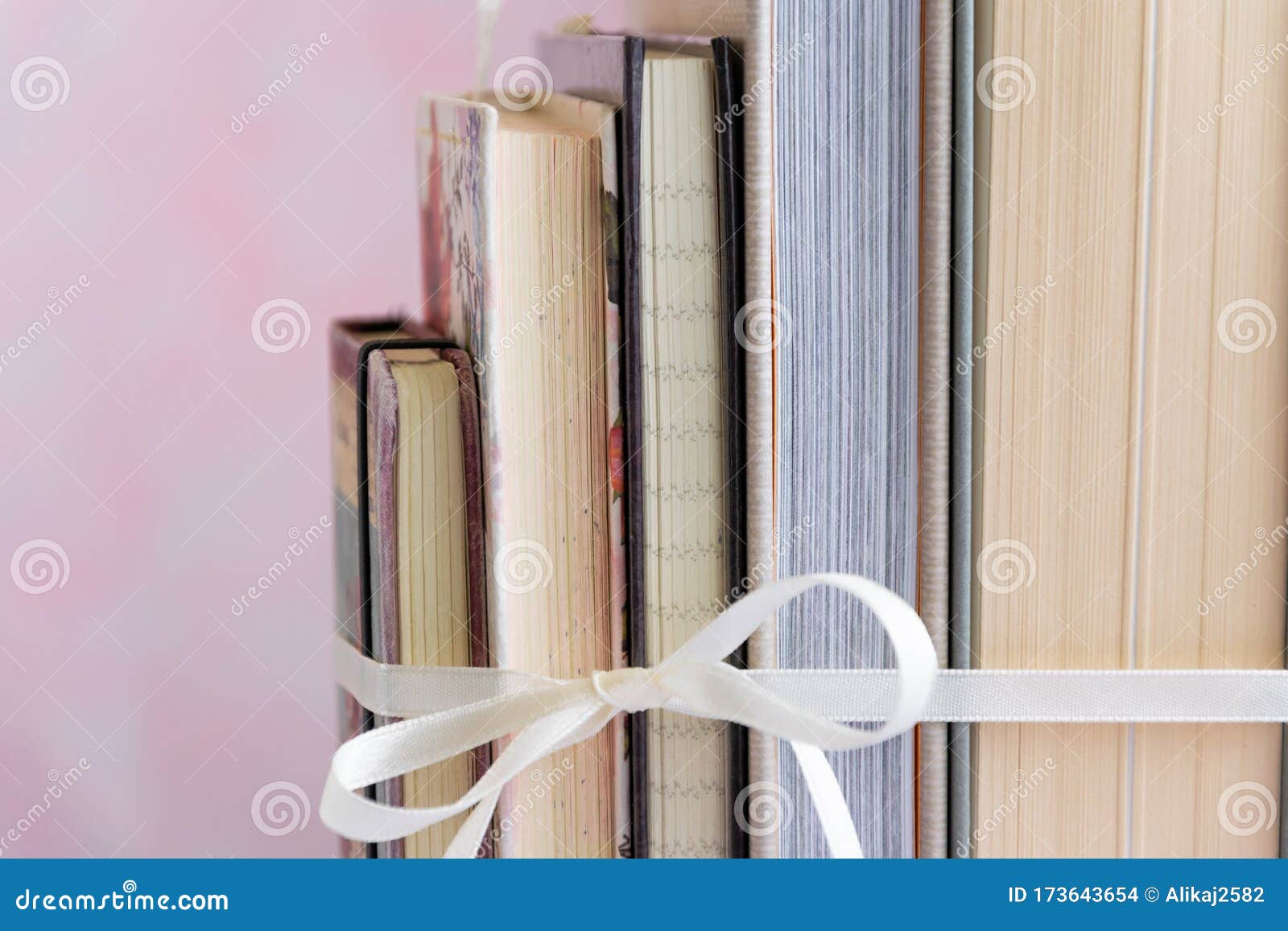 Stack of Books Tied with a Bow Stock Photo - Image of group, background ...