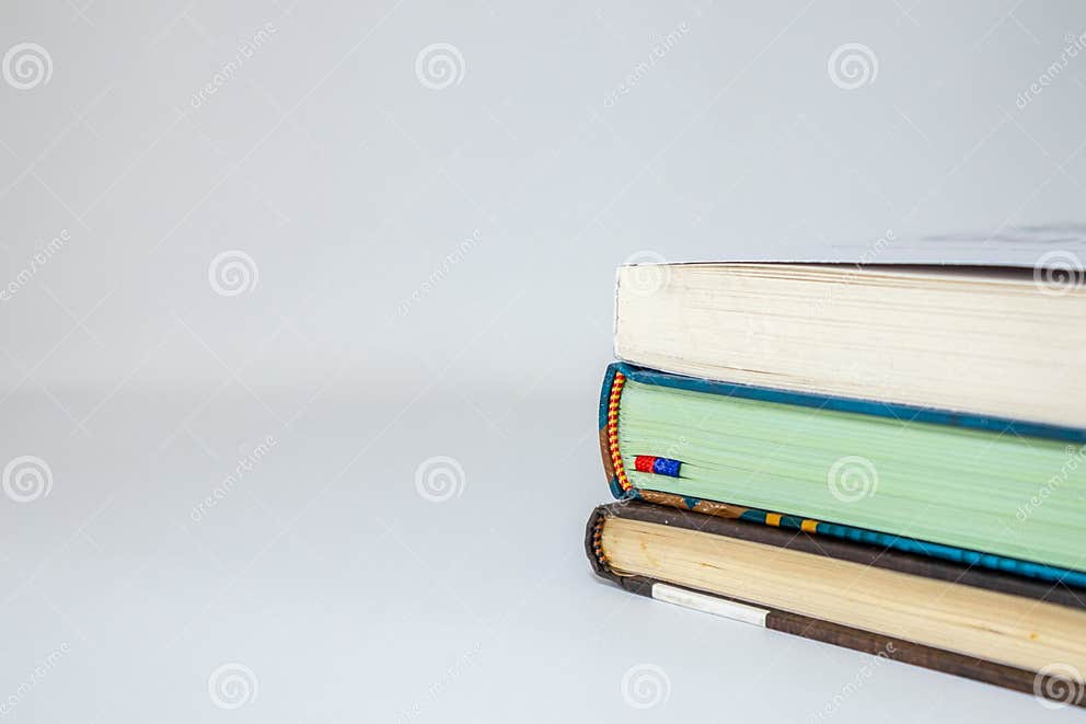 Stack of Books on White Background. Three Different Reading Books Stock ...