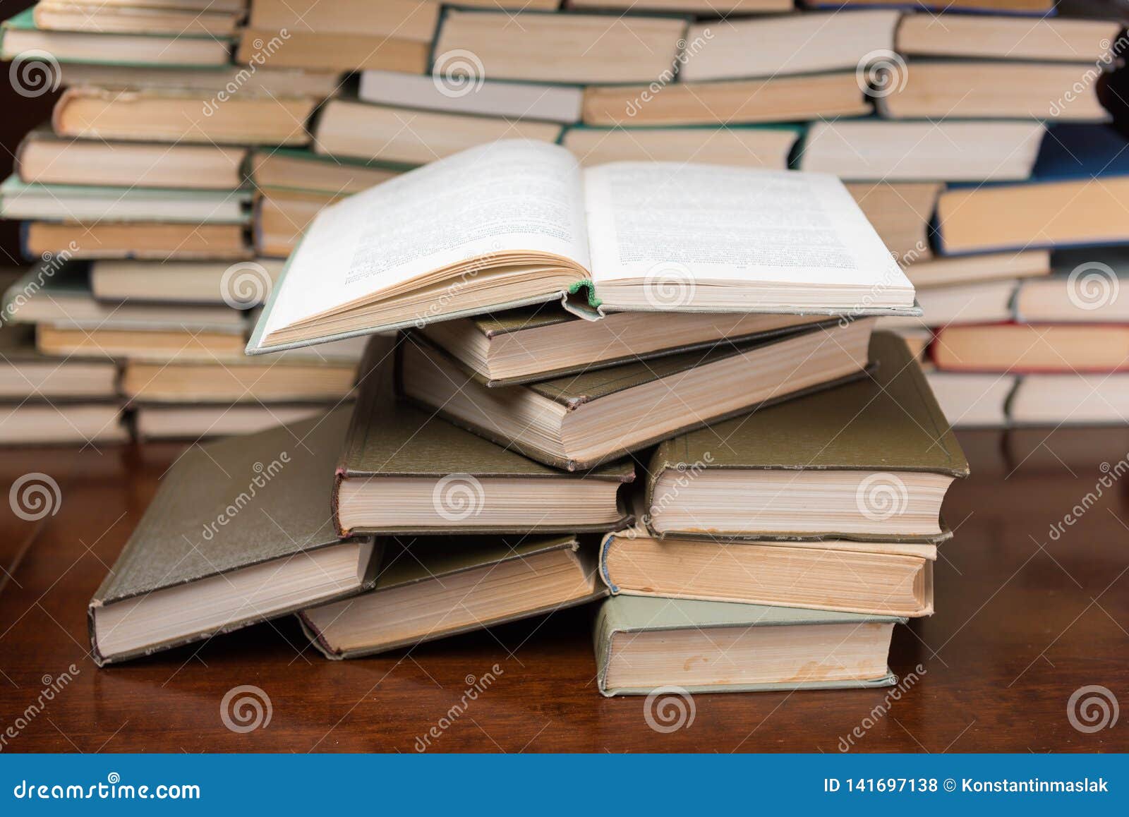 Big Stack of Books on the Wooden Table Stock Photo - Image of group ...