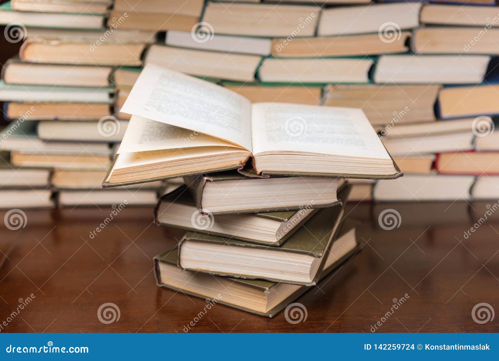 Big Stack of Books on the Wooden Table Stock Photo - Image of library ...
