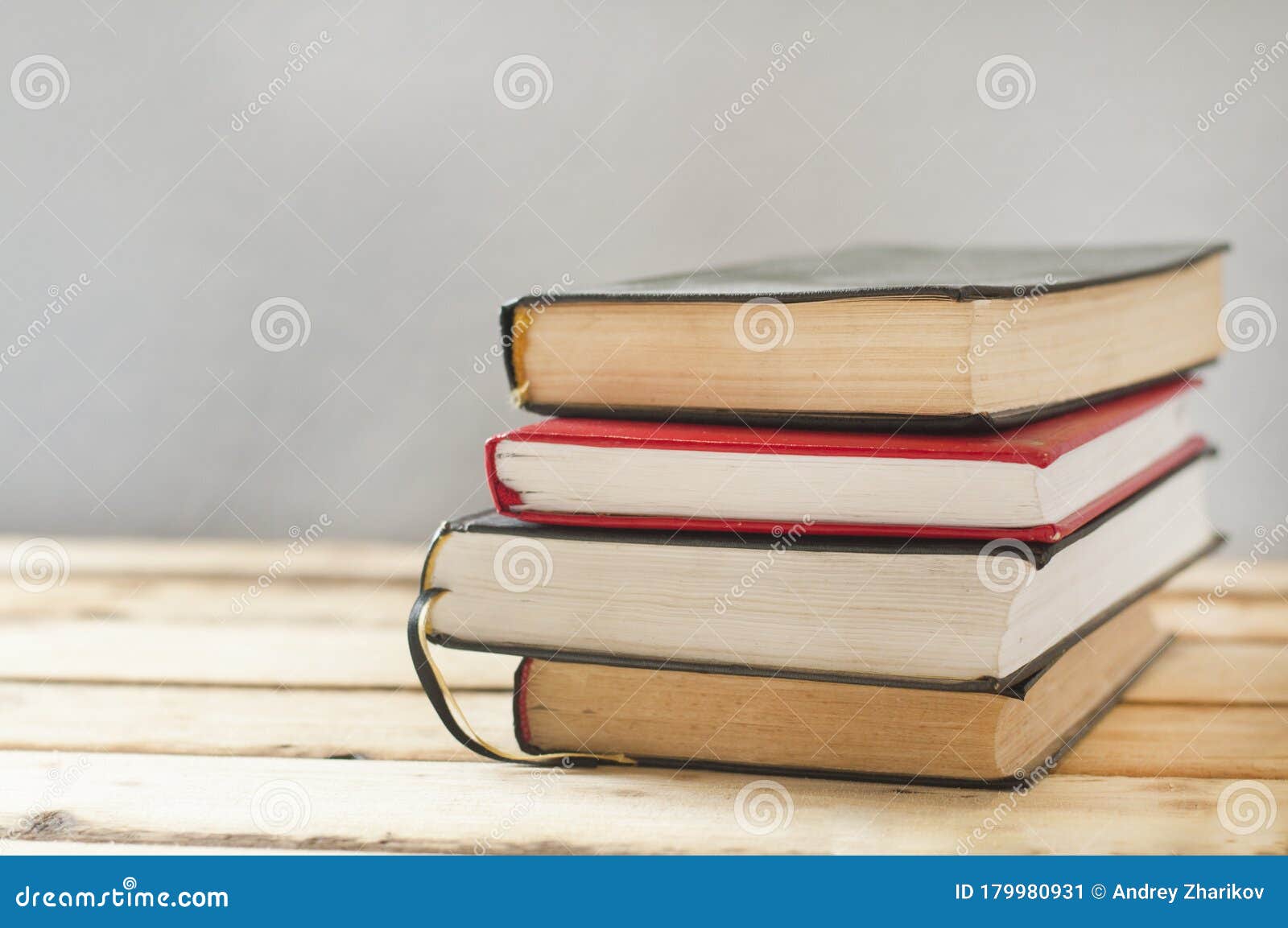 A Stack of Books on a Wooden Table. Stock Image - Image of book, safety ...