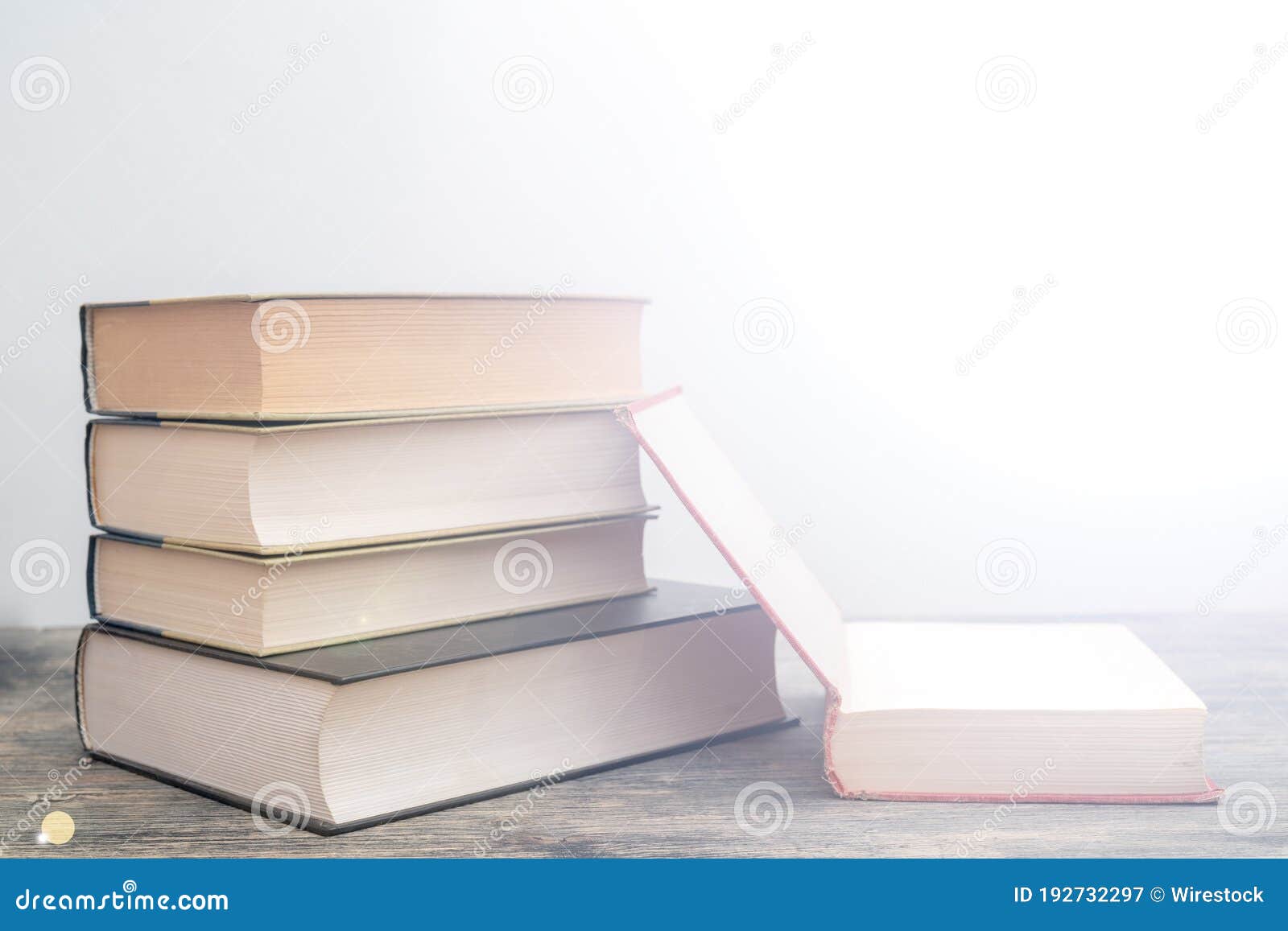 Stack of Books on Wooden Table with White Background Stock Image ...