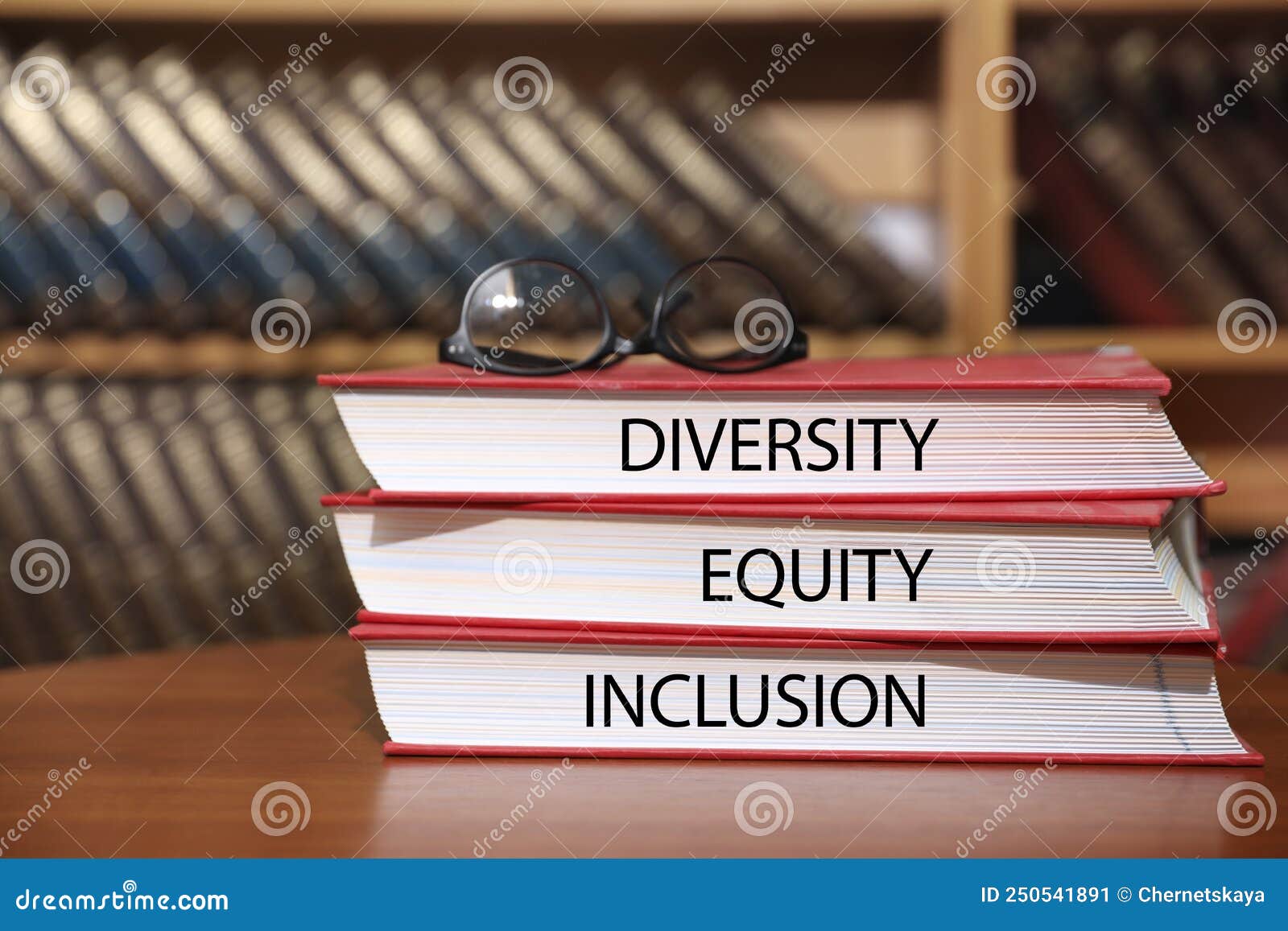 Stack of Books with Words Diversity, Equity, Inclusion and Glasses on ...