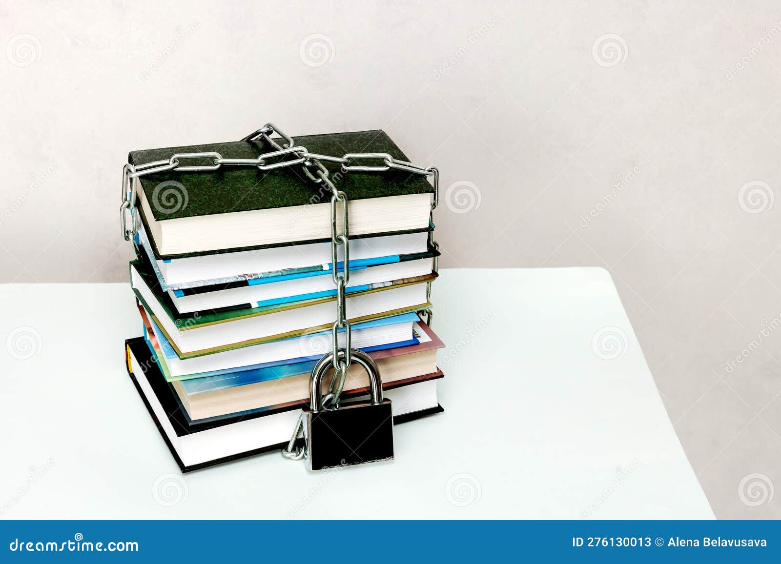 Stack of Books Wrapped in a Chain and Padlocked Stock Image - Image of ...