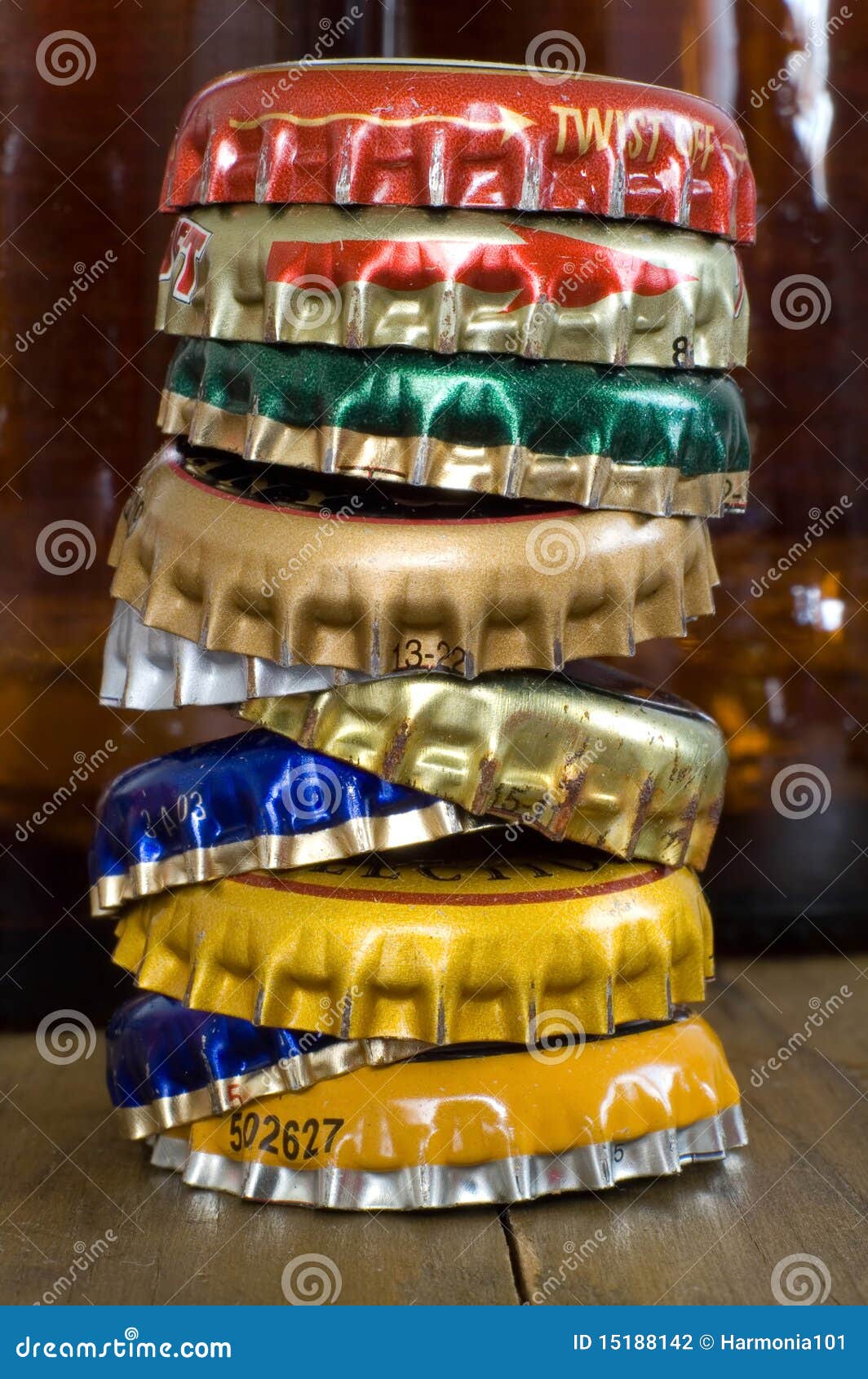 A stack of bottle caps stock photo. Image of liquid, close - 15188142