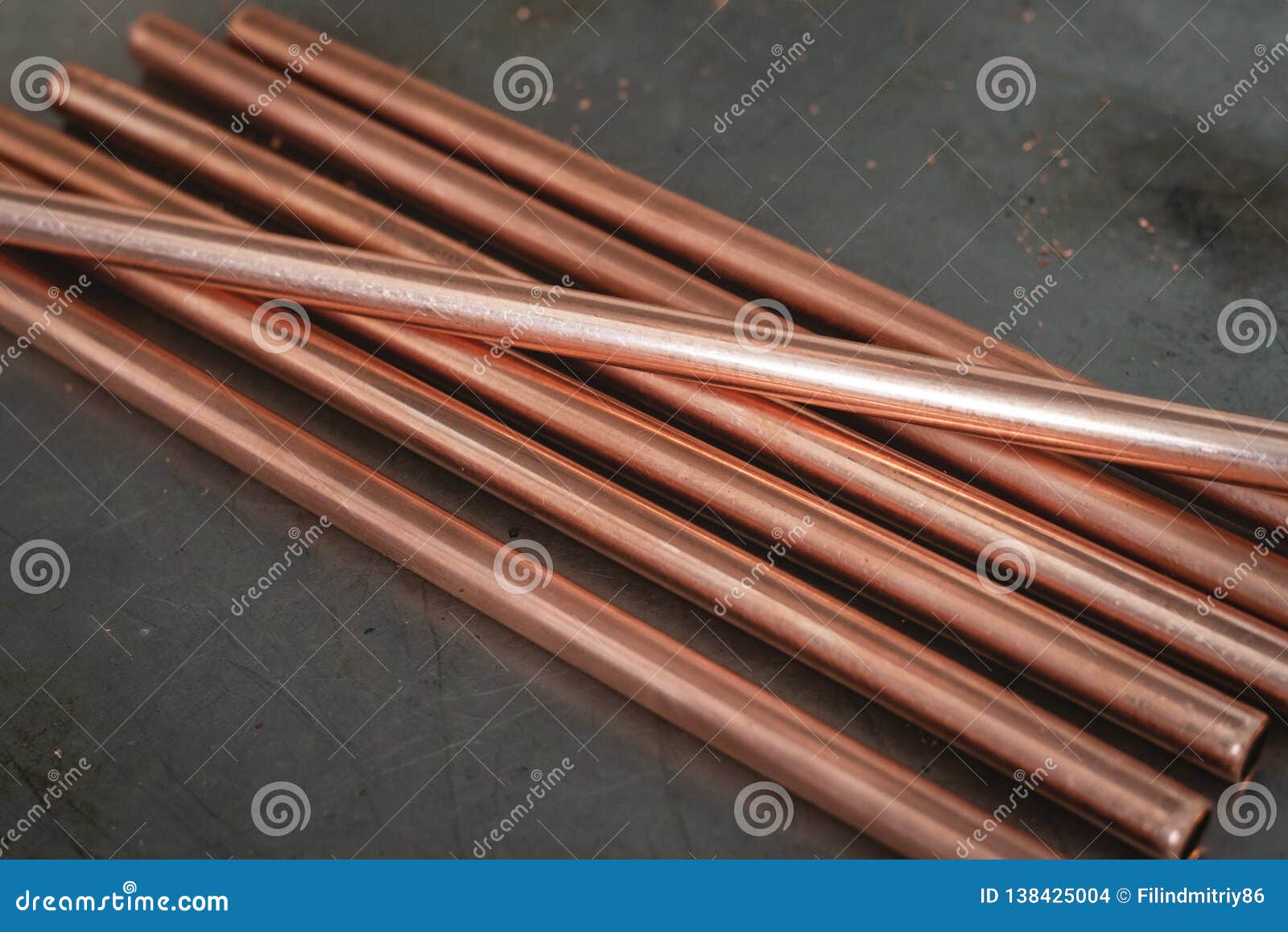 Stack of brass pipes. stock photo. Image of cooling - 138425004