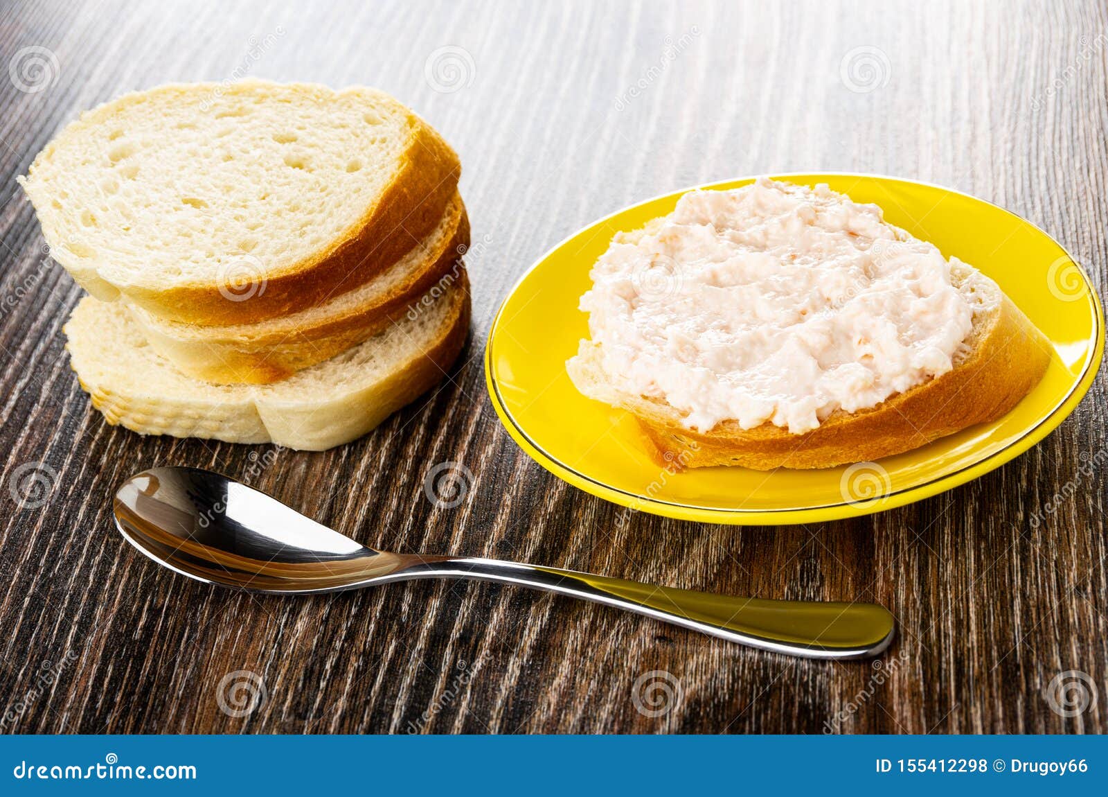 Stack of Bread, Sandwich with Krill Paste in Saucer, Spoon on Wooden ...