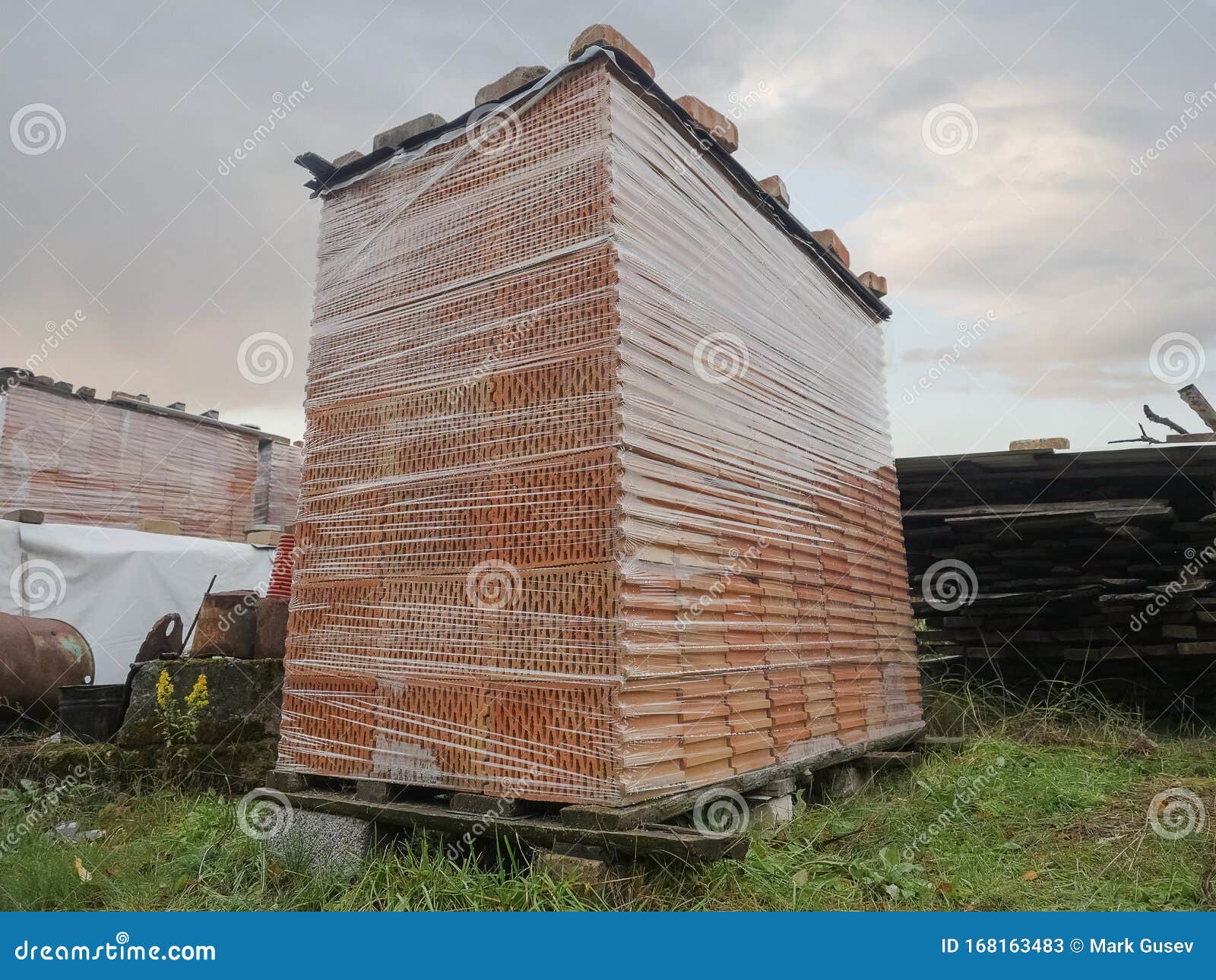 Stack of Bricks in a Yard, Concept Construction. Stock Image - Image of ...