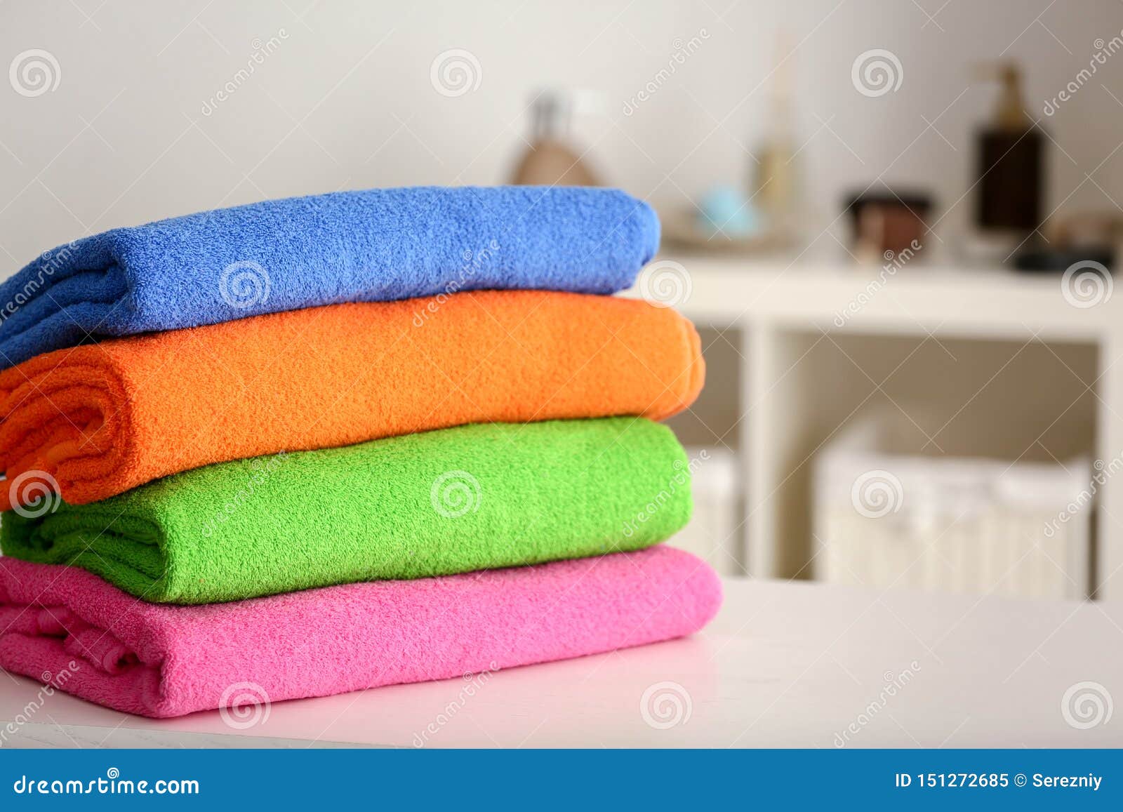 Stack of Bright Color Towels on Table Stock Image - Image of soft ...