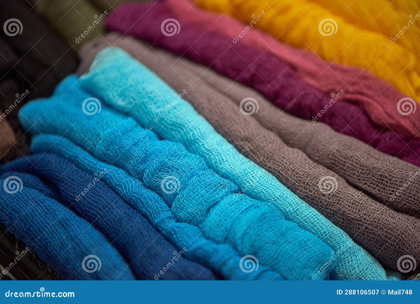 A Stack of Bright Gauze Fabrics of Different Colors. Fabric Texture ...