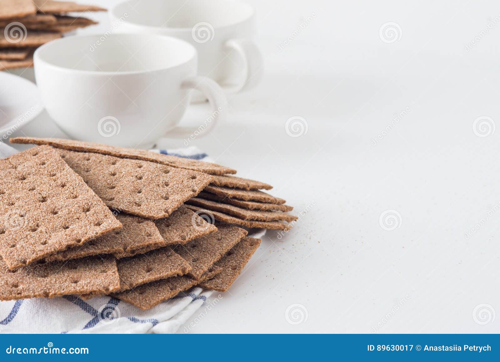 Stack of Brown Rye Crispy Bread Swedish Crackers with Two Cups and ...
