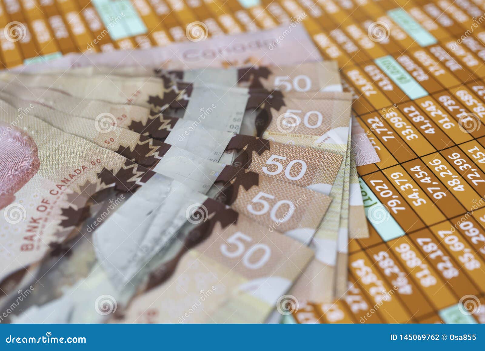 Stack of Canadian Dollar Notes on a Spreadsheet Stock Photo - Image of ...