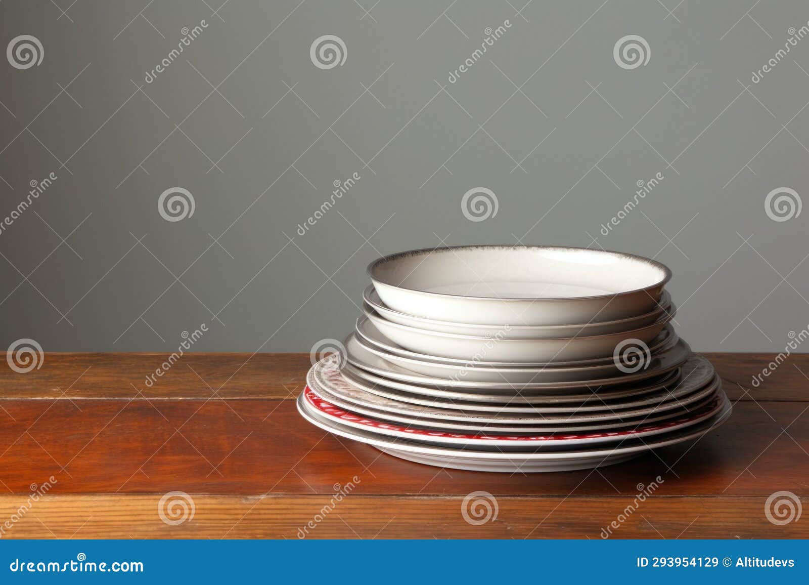 A Stack of Canned Goods with a Small Empty Plate Stock Image - Image of ...