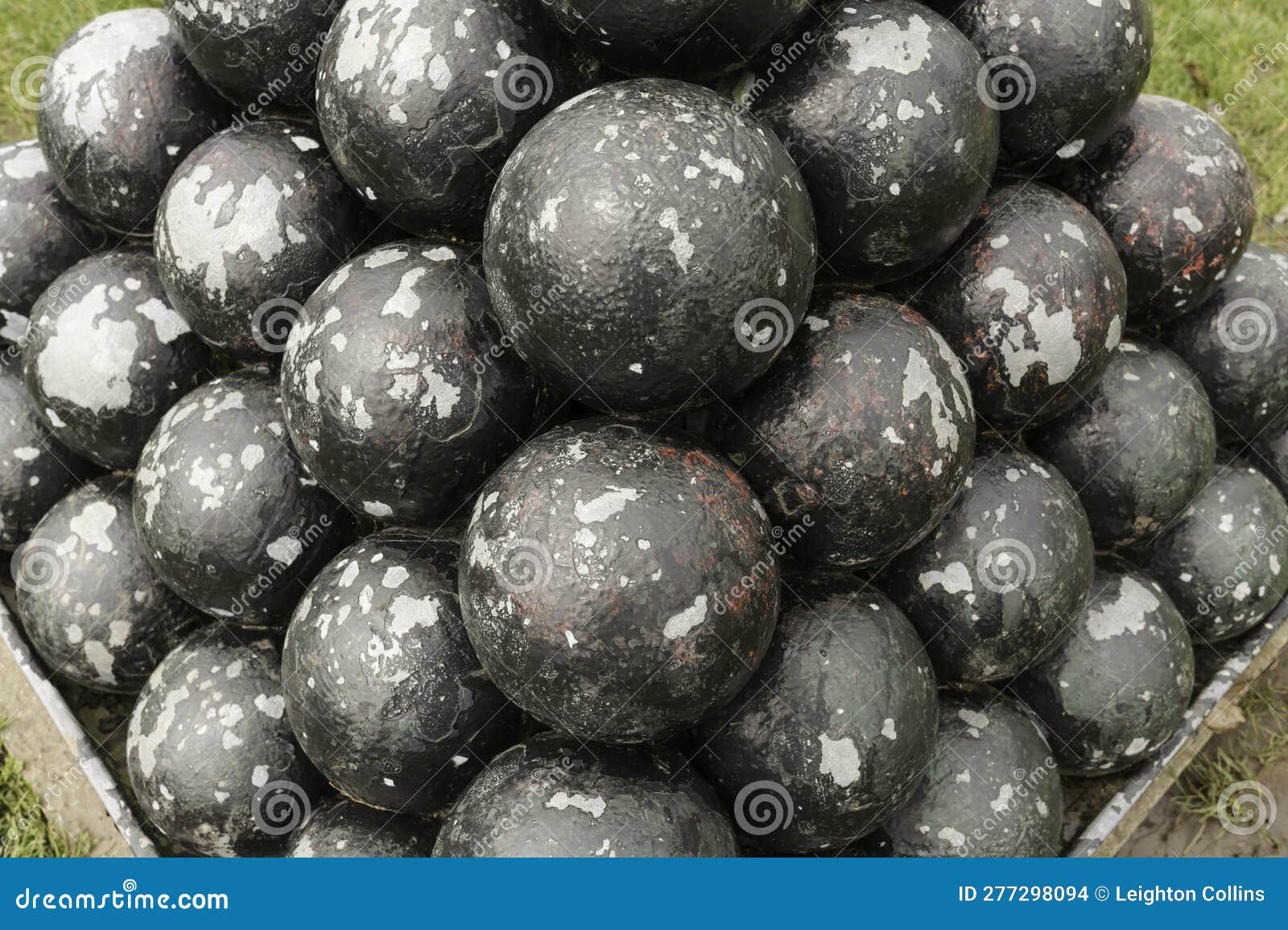 A stack of cannonballs stock photo. Image of large, cannonballs - 277298094