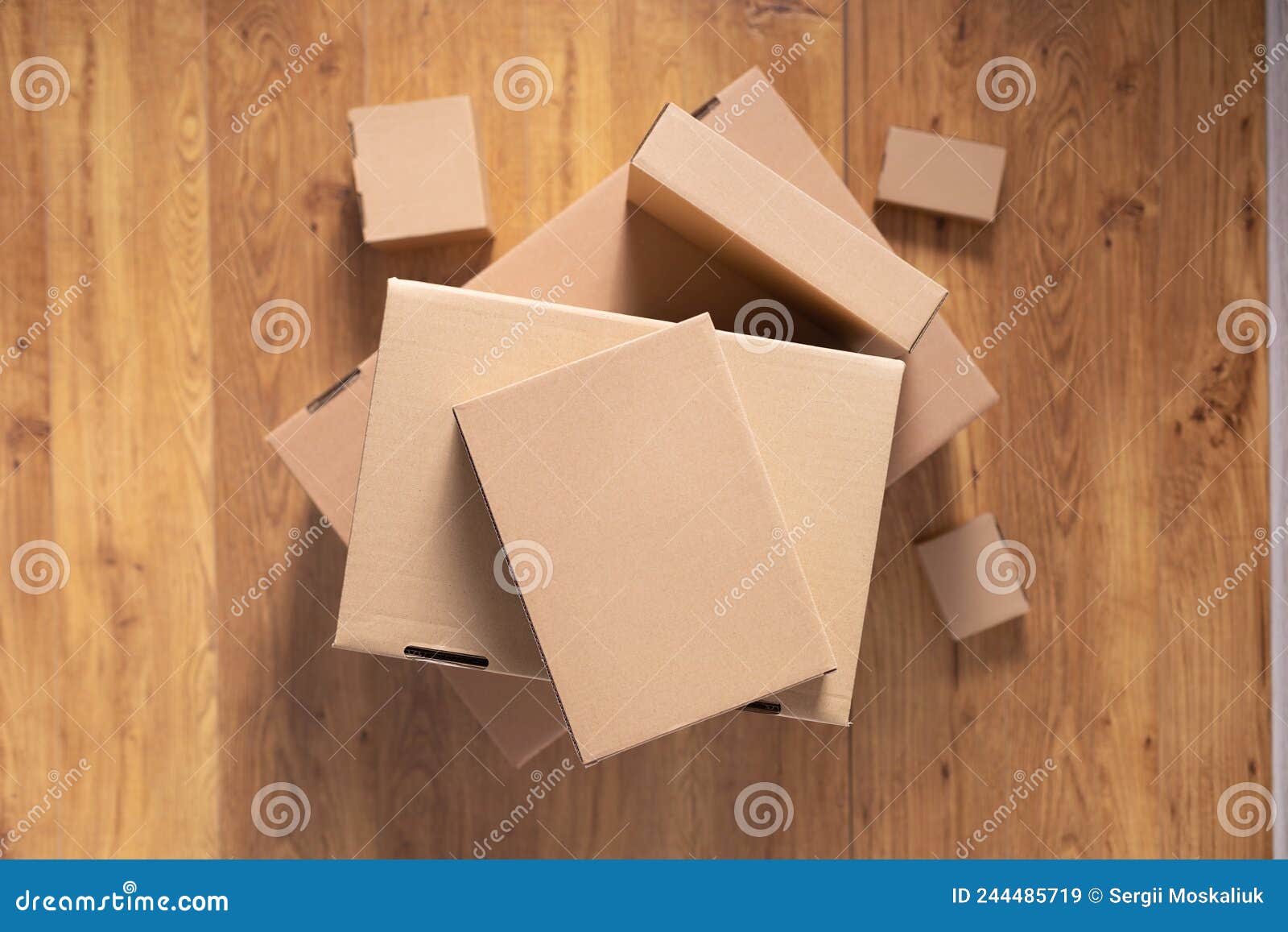 Stack of Cardboard Box on Floor Laminate Background. Empty Box Case Top ...