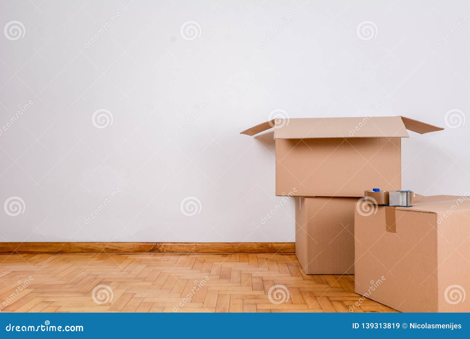 Stack of Cardboard Boxes in the Empty Room Stock Image - Image of ...