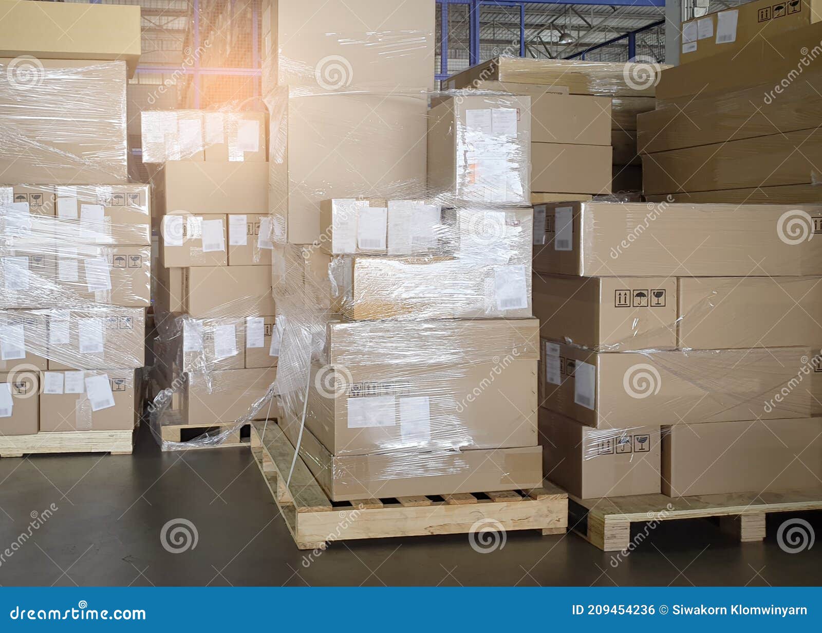 Stack of Cardboard Boxes on Pallet Rack in Warehouse Storage. Shipment ...