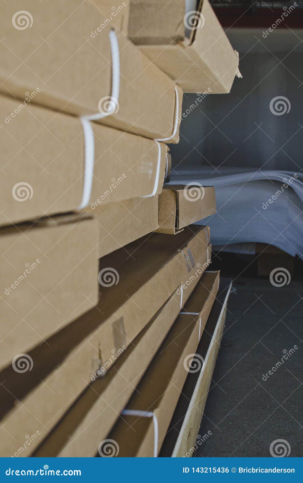 A Stack of Cardboard Boxes in the Warehouse. Stock Photo - Image of ...
