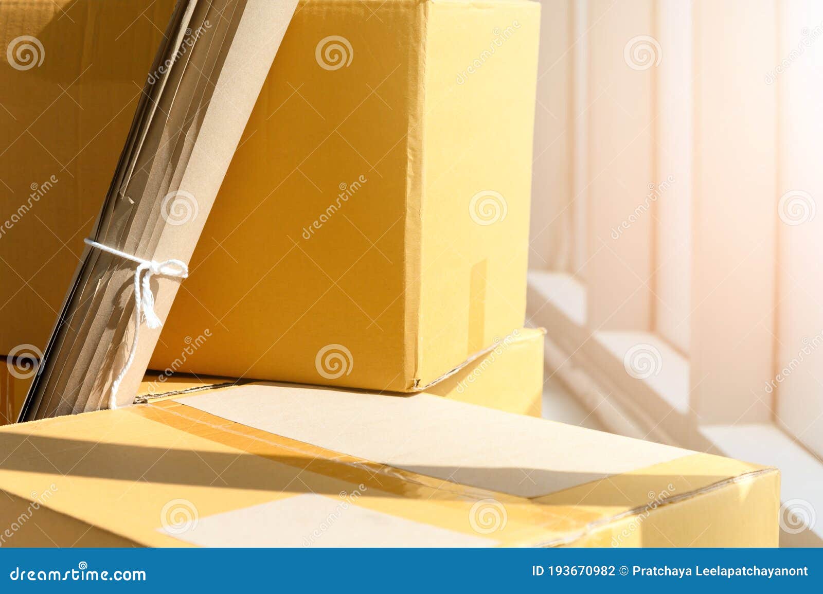 Stack of Cardboard Near Big Window Inside of Modern Living Room Stock ...