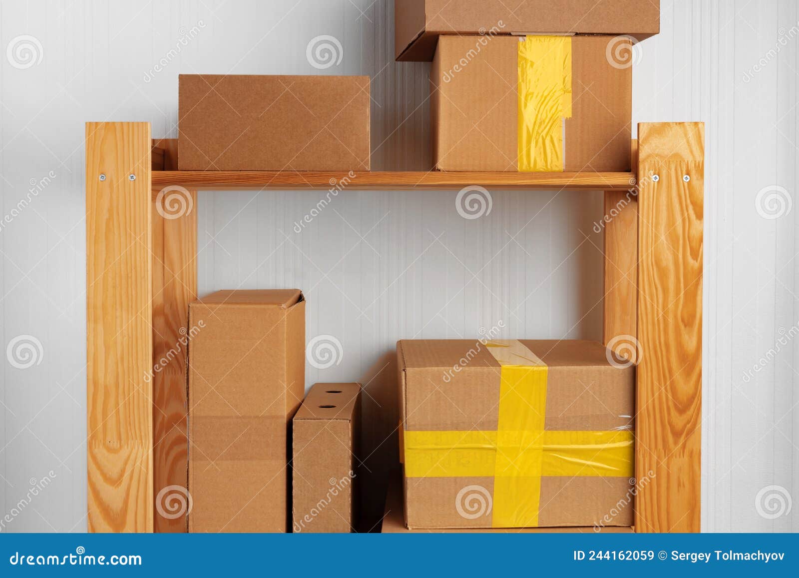 Stack of Cardboard Package Boxes on Wooden Rack Stock Image - Image of ...