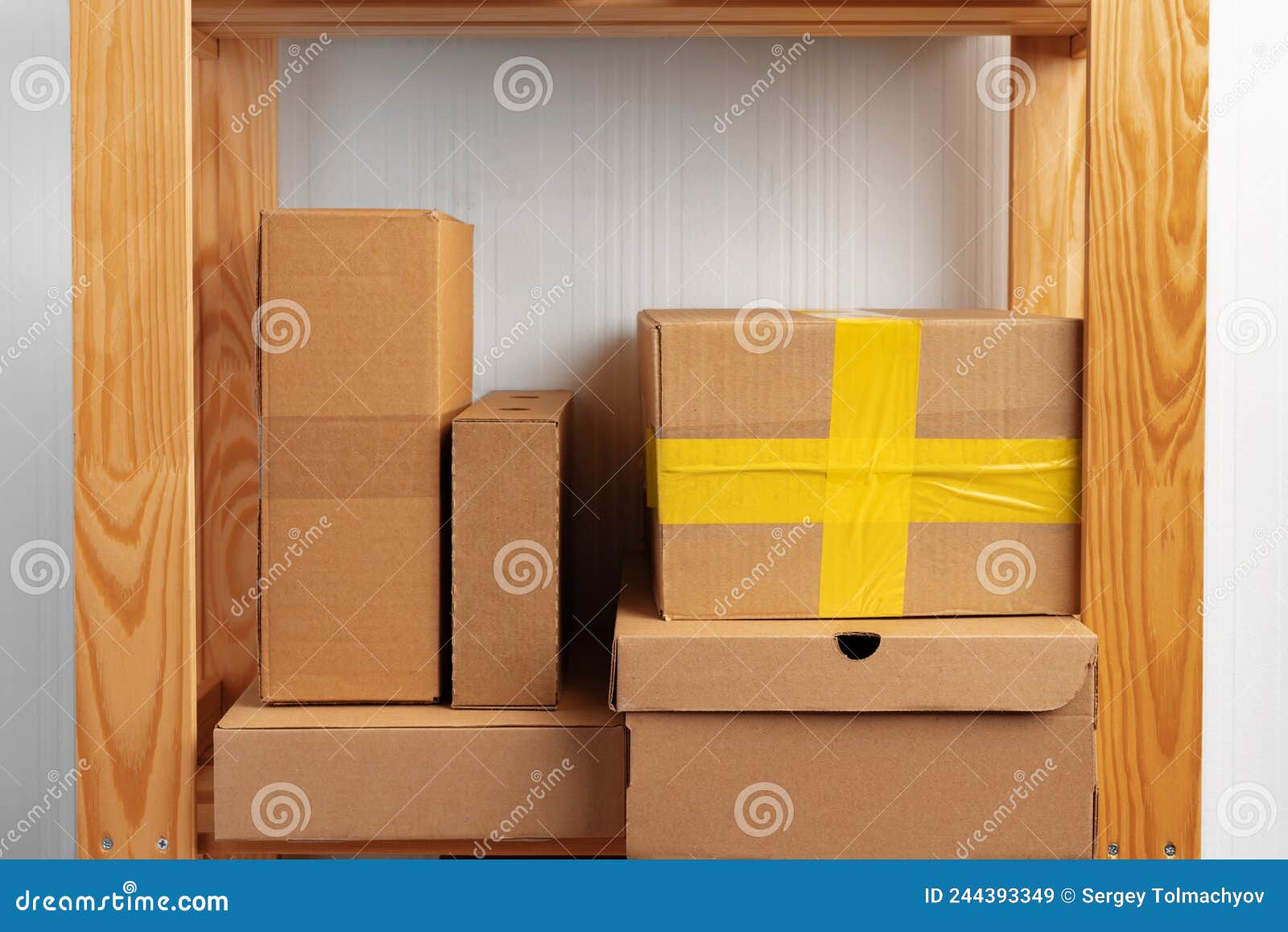 Stack of Cardboard Package Boxes on Wooden Rack Stock Image - Image of ...