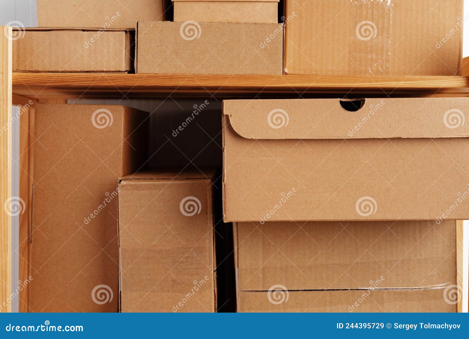 Stack of Cardboard Package Boxes on Wooden Rack Stock Image - Image of ...