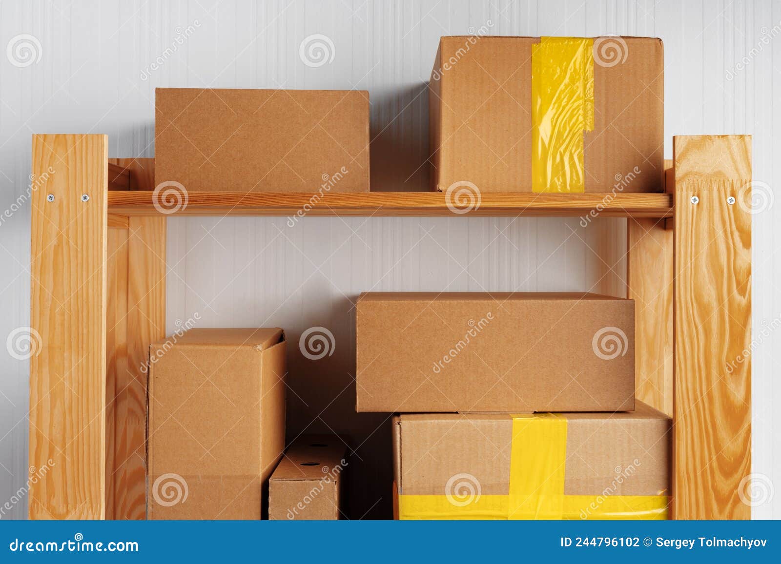 Stack of Cardboard Package Boxes on Wooden Rack Stock Photo - Image of ...