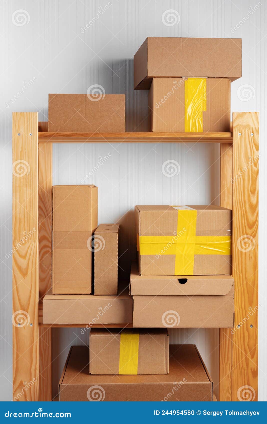 Stack of Cardboard Package Boxes on Wooden Rack Stock Photo - Image of ...