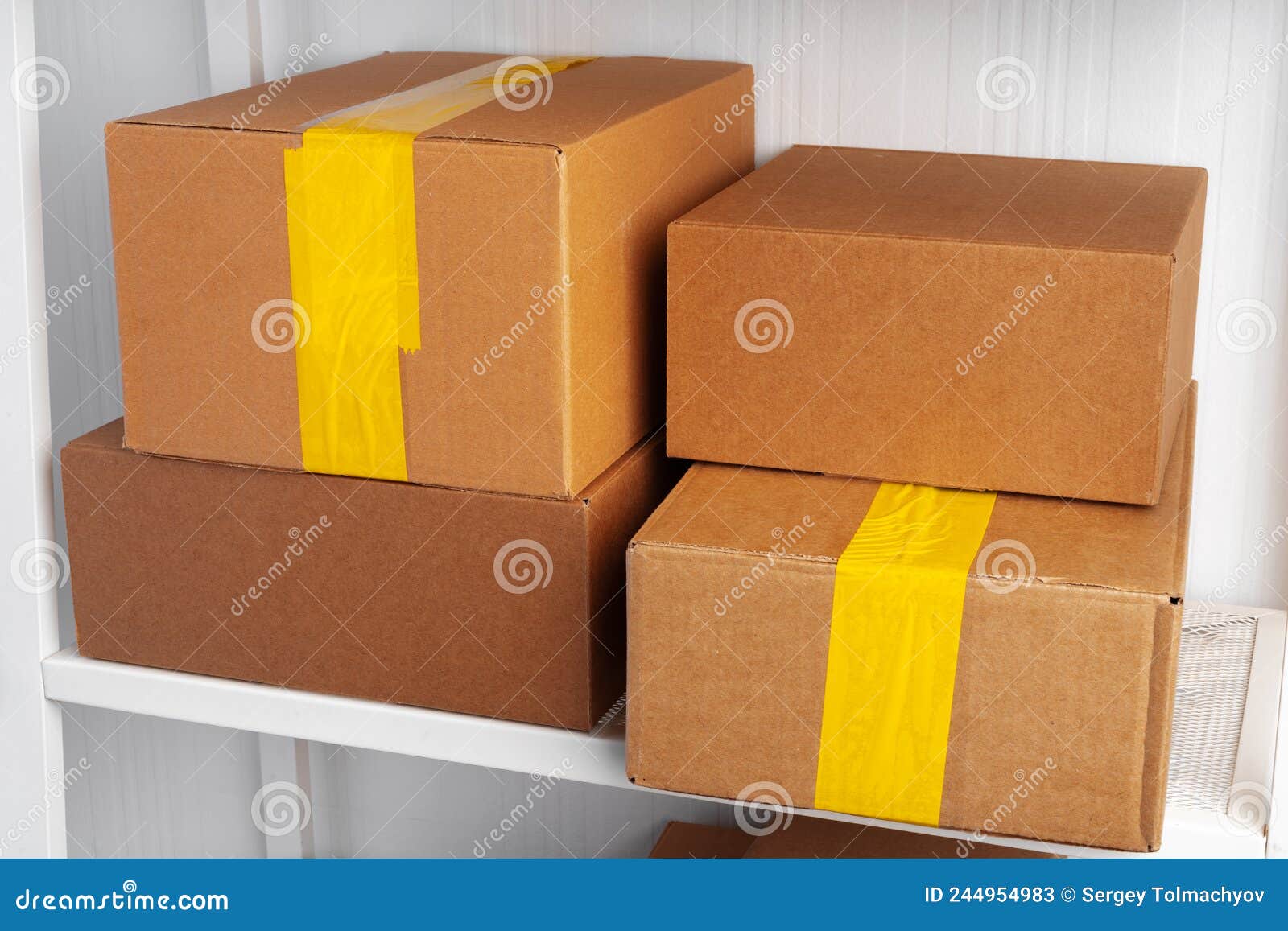 Stack of Cardboard Package Boxes on Wooden Rack Stock Image - Image of ...