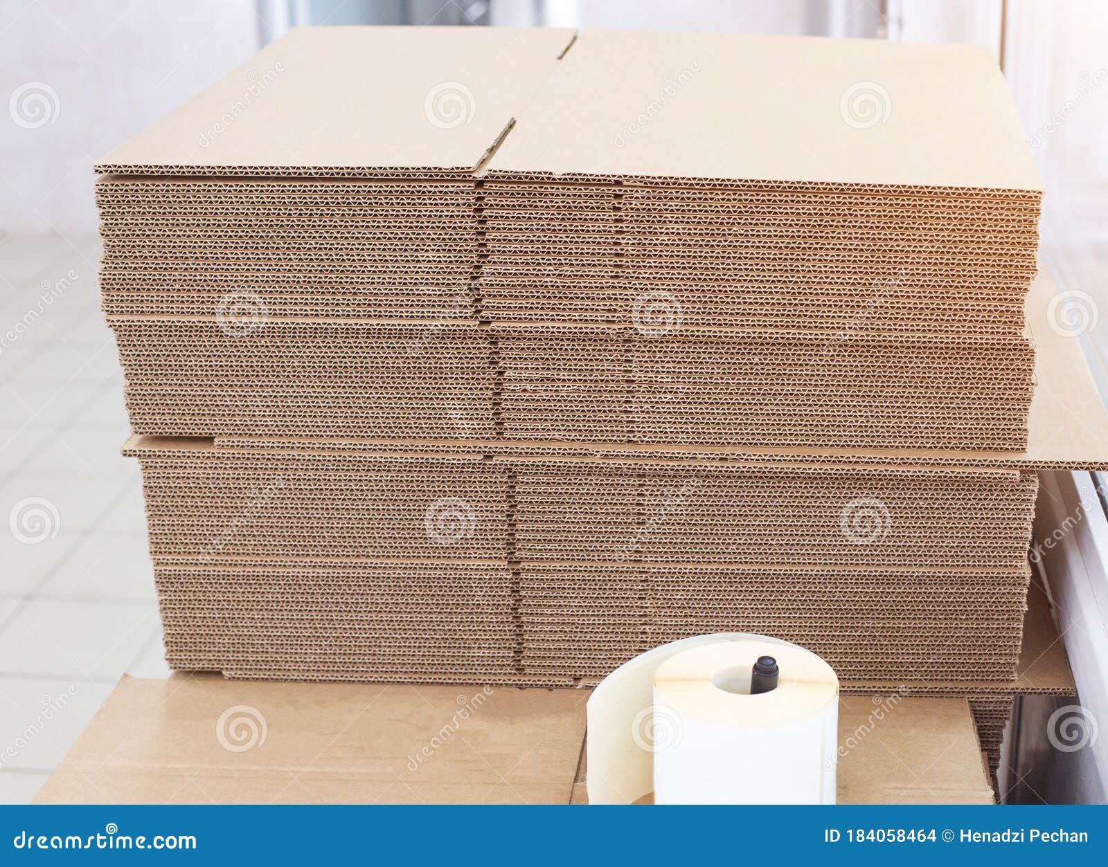 A Stack of Cardboard Sheets for Packing Boxes in Production. Pulp ...
