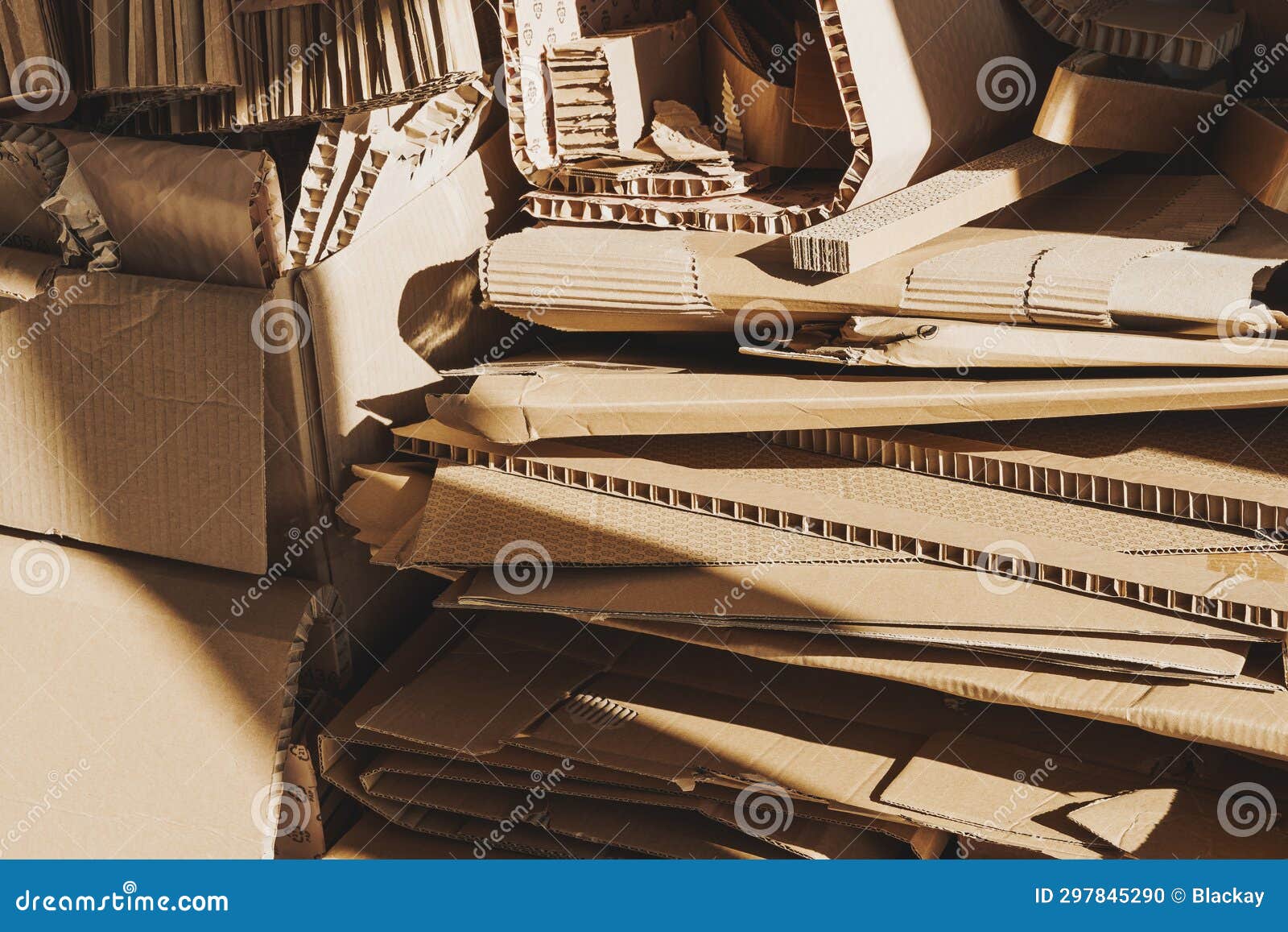 Stack of Cardboard Waste in Sunlight. Concepts of Paper Recycling and ...