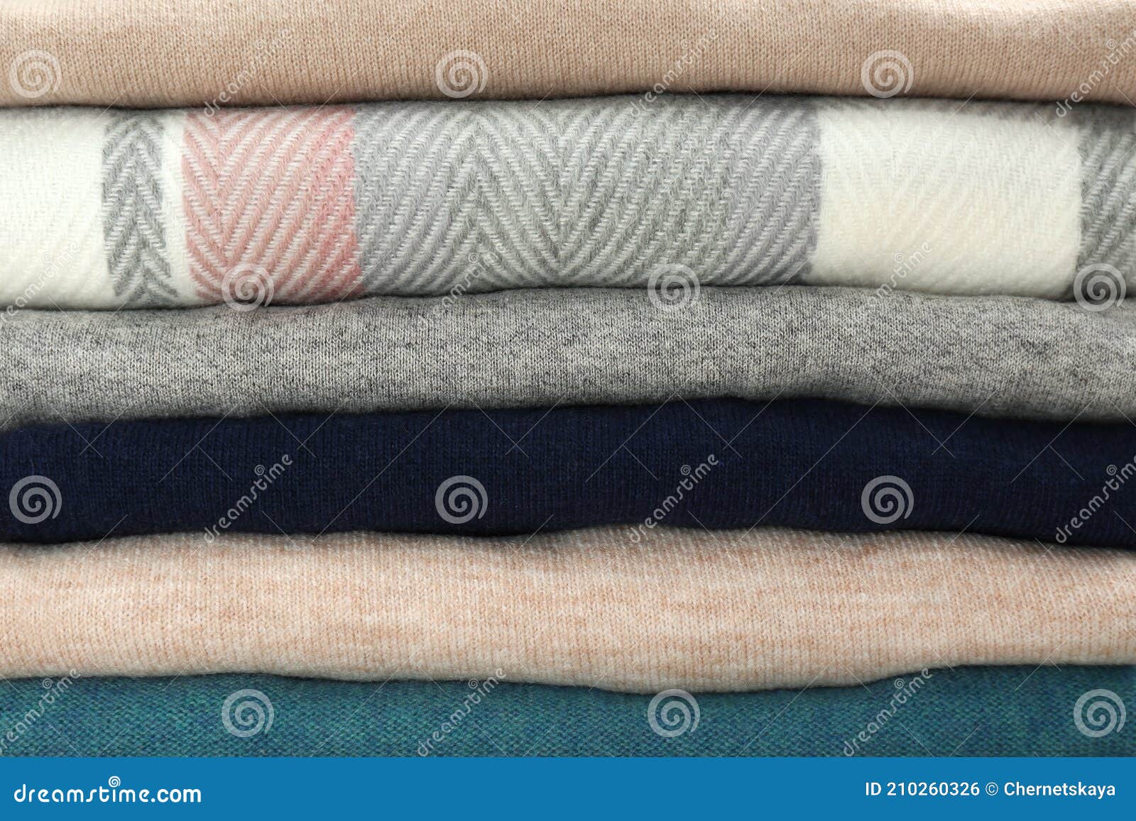 Stack of Cashmere Clothes As Background, Closeup Stock Photo - Image of ...