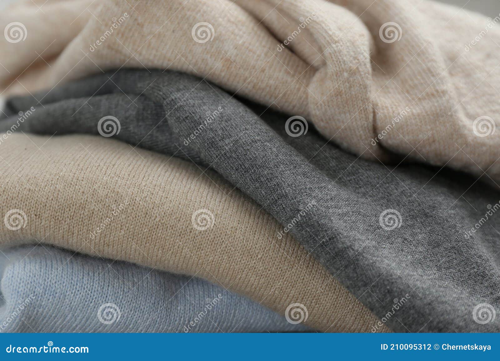 Stack of Cashmere Clothes As Background, Closeup Stock Photo - Image of ...