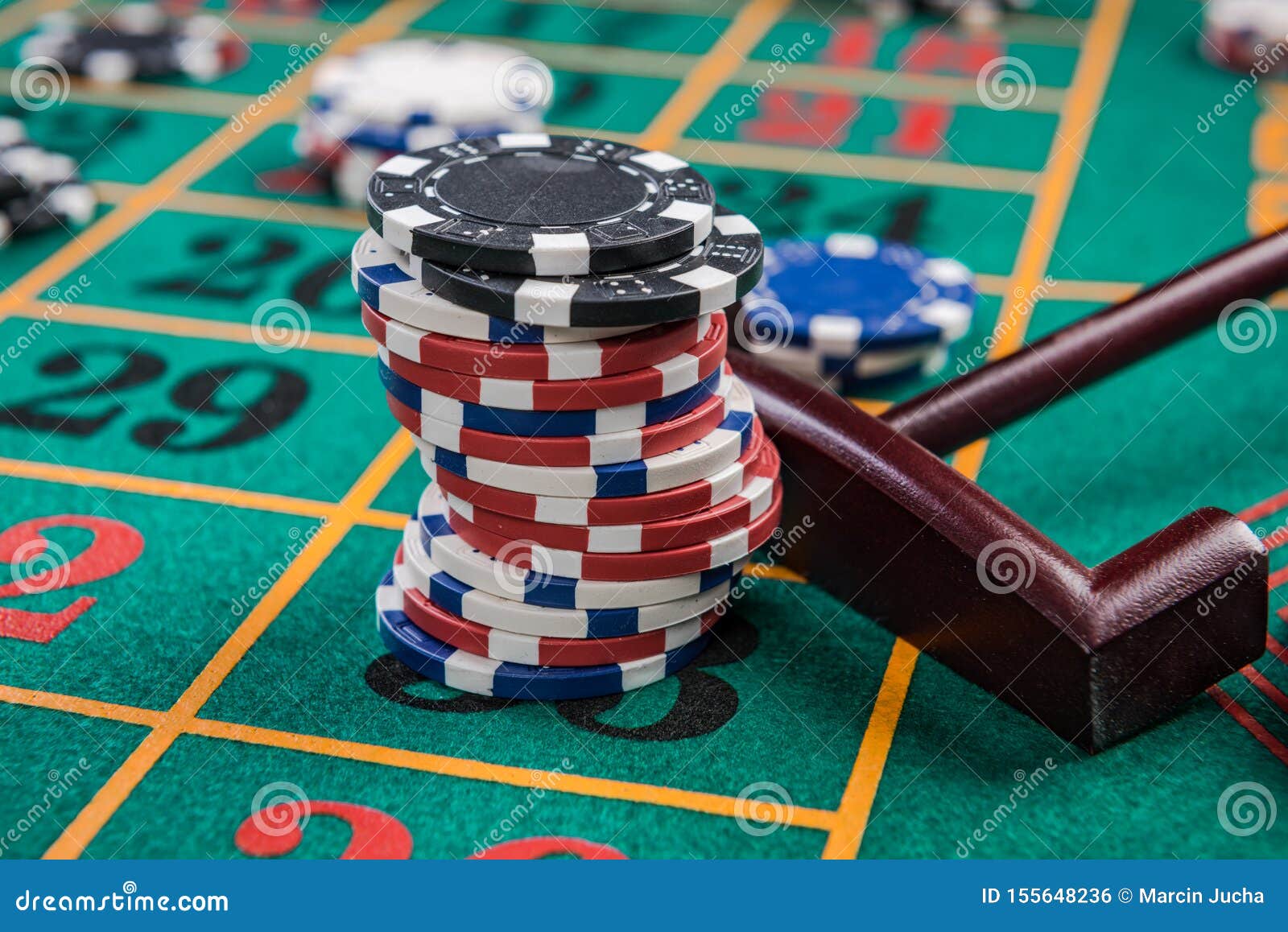 Stack of Casino Chips on Green Felt Roulette Table Stock Photo - Image ...
