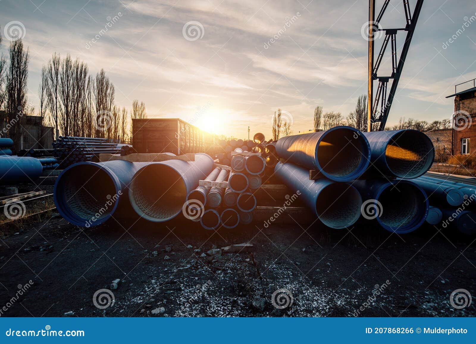 Stack of Cast Iron Pipes in Loading Area Waiting for Transportation ...