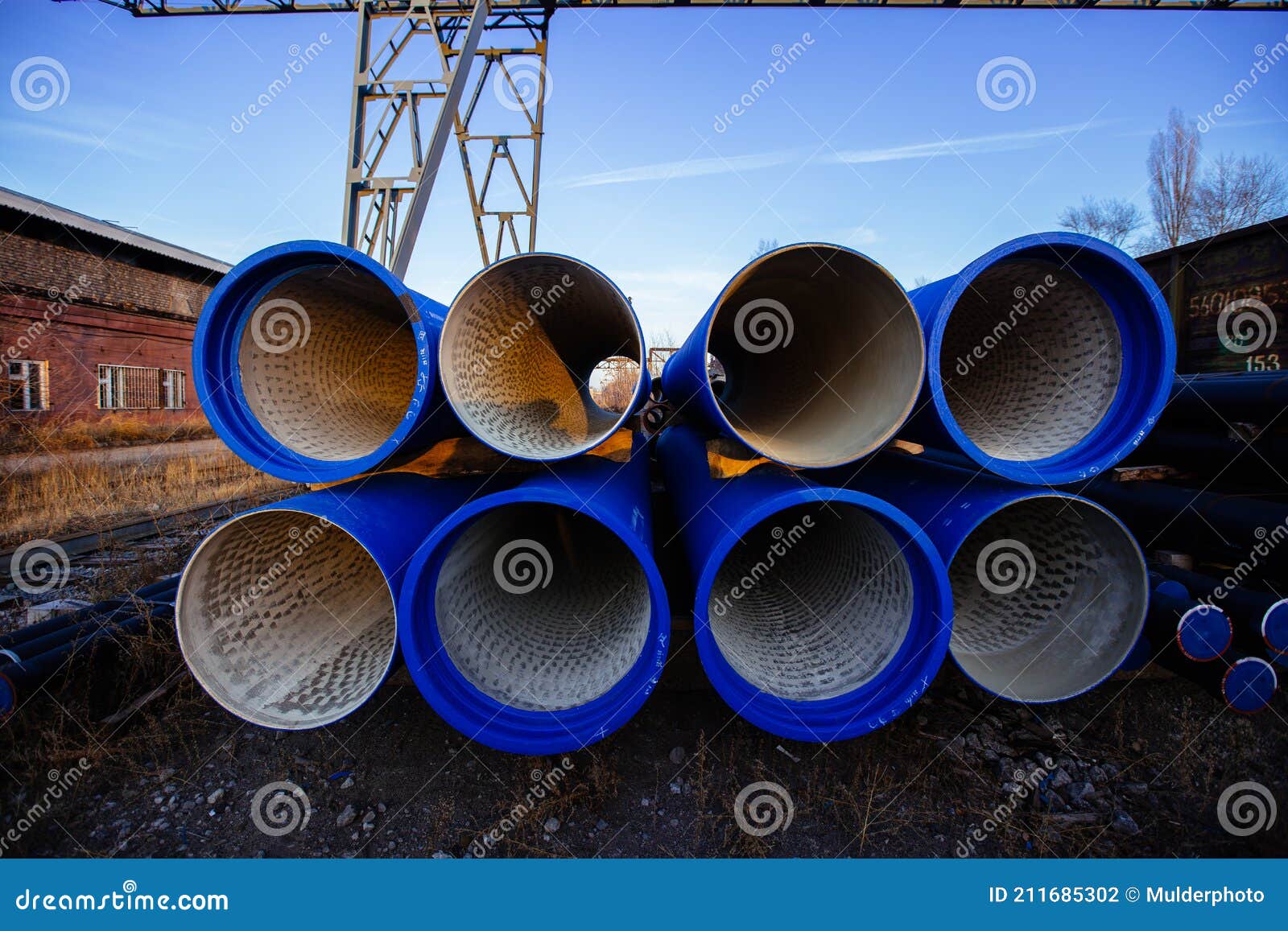 Stack Of Cast Iron Pipes In Loading Area Waiting For Transportation ...
