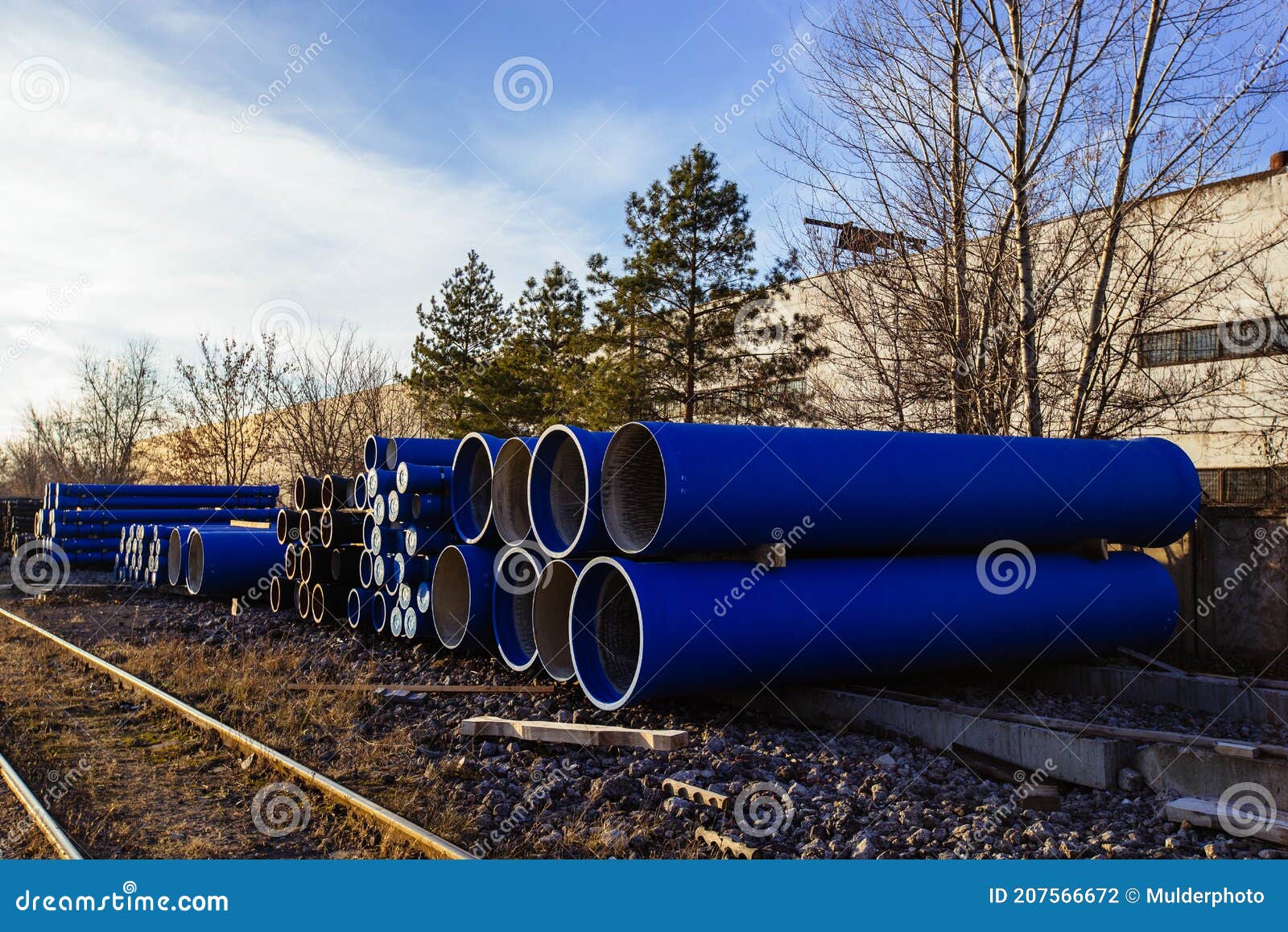 Stack Of Cast Iron Pipes In Loading Area Waiting For Transportation ...