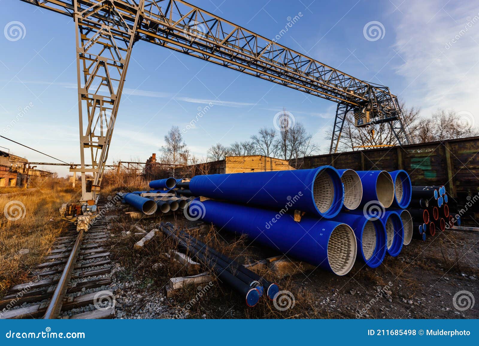 Stack of Cast Iron Pipes in Loading Area Waiting for Transportation ...