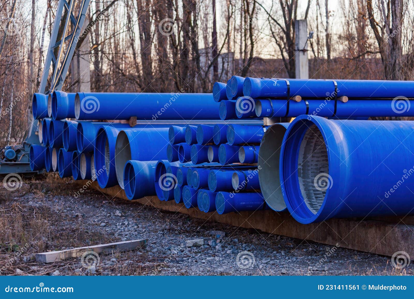 Stack of Cast Iron Pipes in Loading Area Waiting for Transportation ...