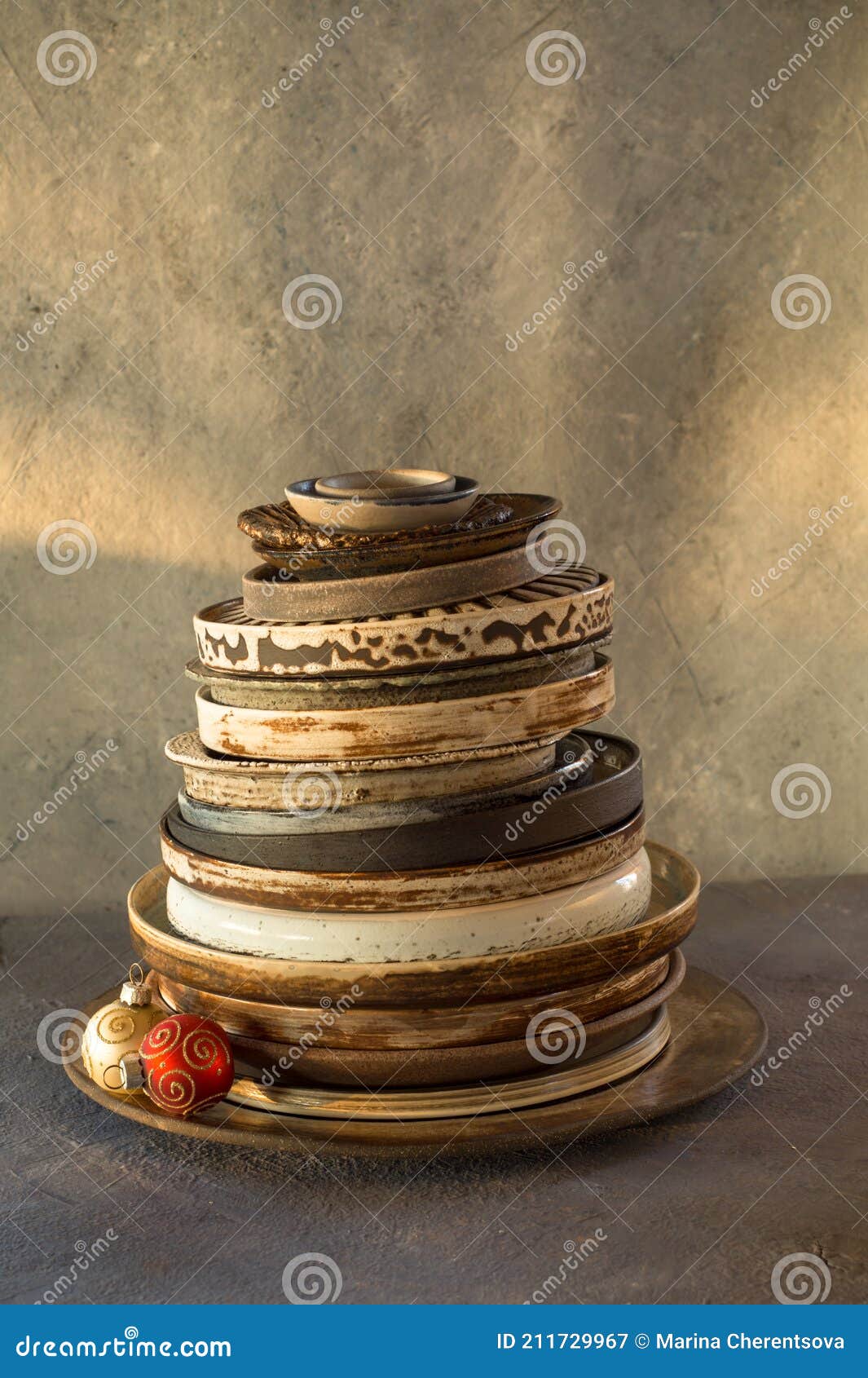 A Stack of Ceramic Plates and Glass Balls Stock Image - Image of plate ...