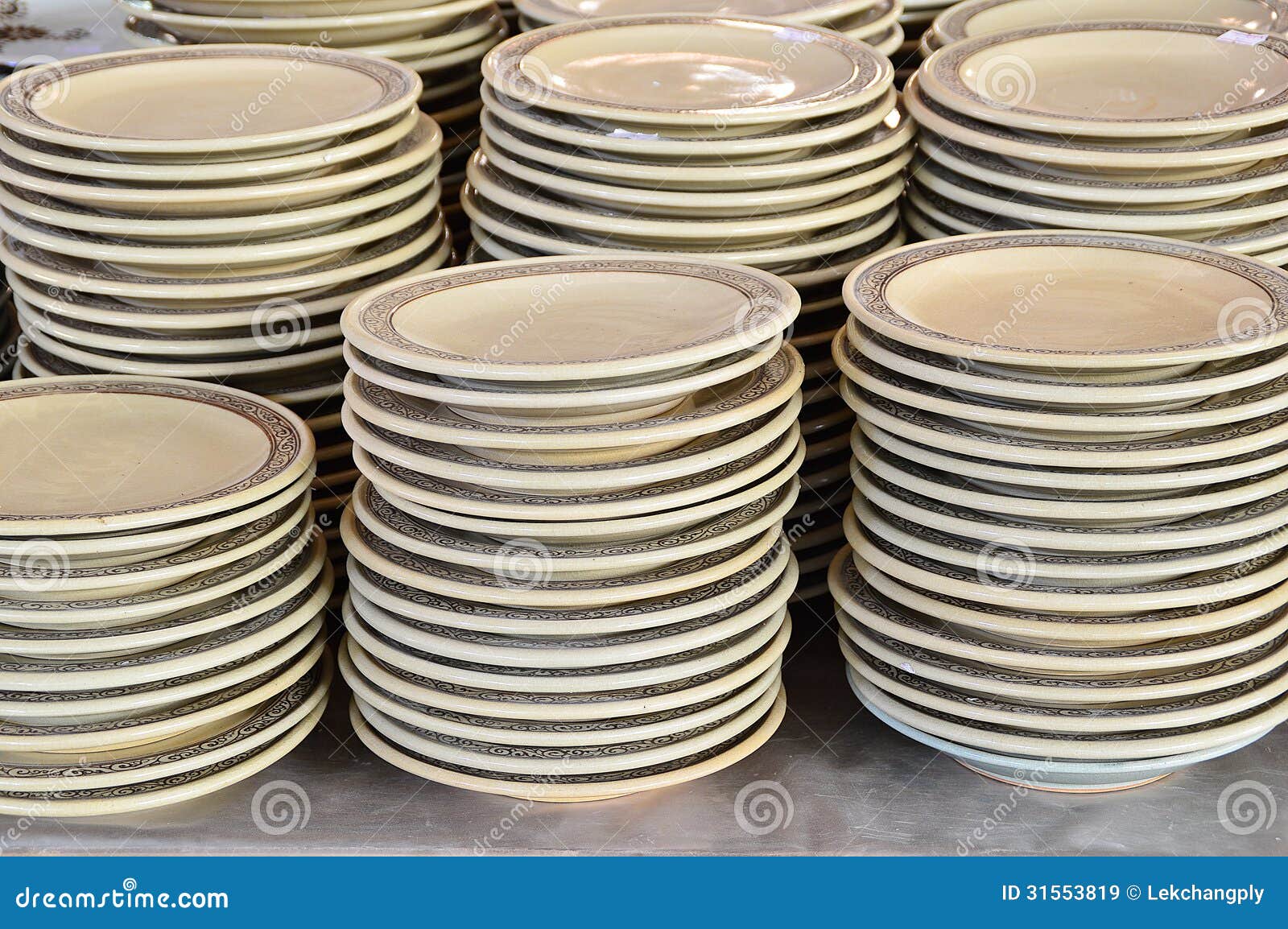 Stack of ceramic plates stock image. Image of setting - 31553819