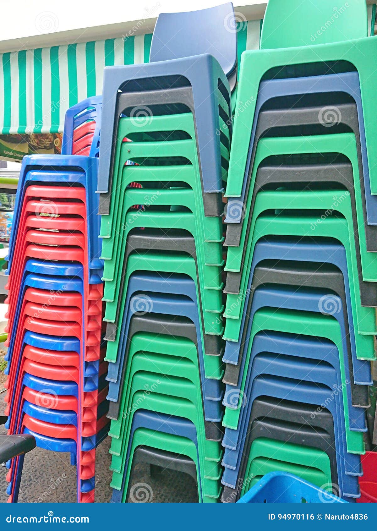 Stack of chairs stock photo. Image of colour, stack, shops - 94970116