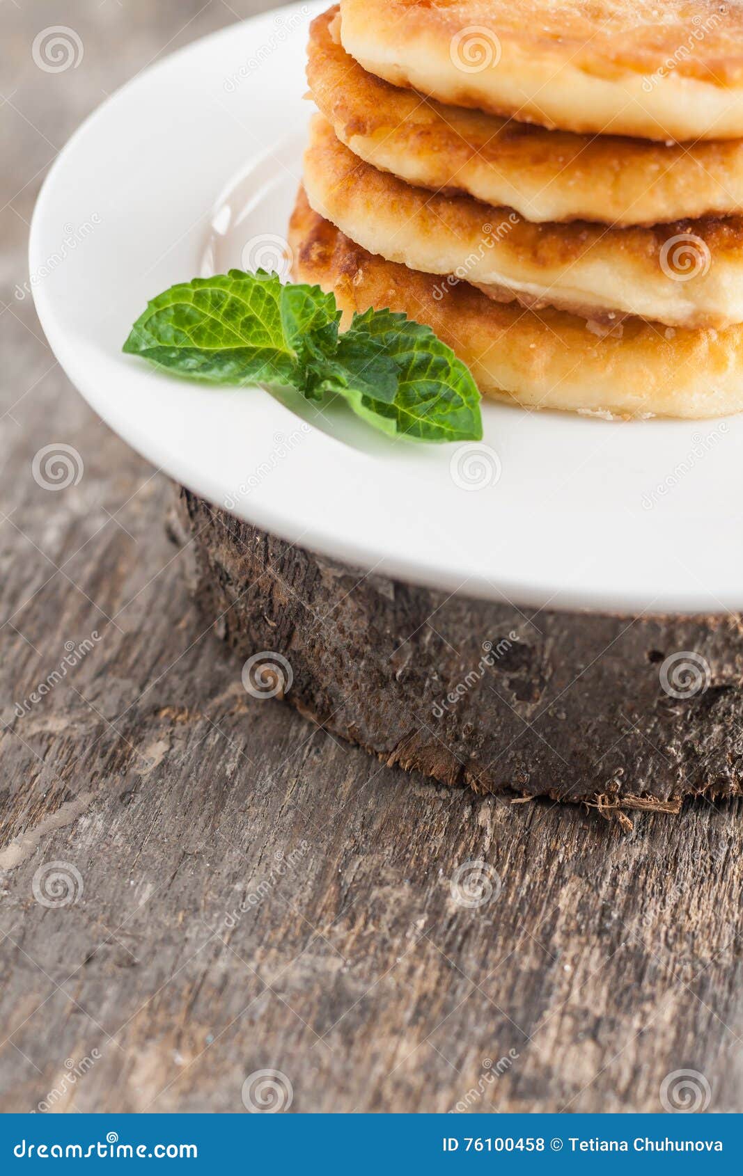 Stack of Cheesecakes on a White Plate and a Dark Wooden Backgrou Stock ...