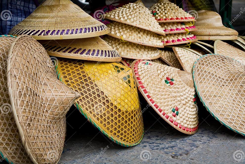 Stack of Chinese Rice Farmers Conical Straw Hats Stock Photo - Image of ...