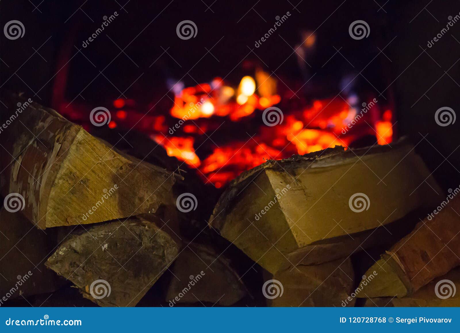 Stack of Chipped Firewood Lit Warm Lamp Light, Fuel for the Fireplace ...